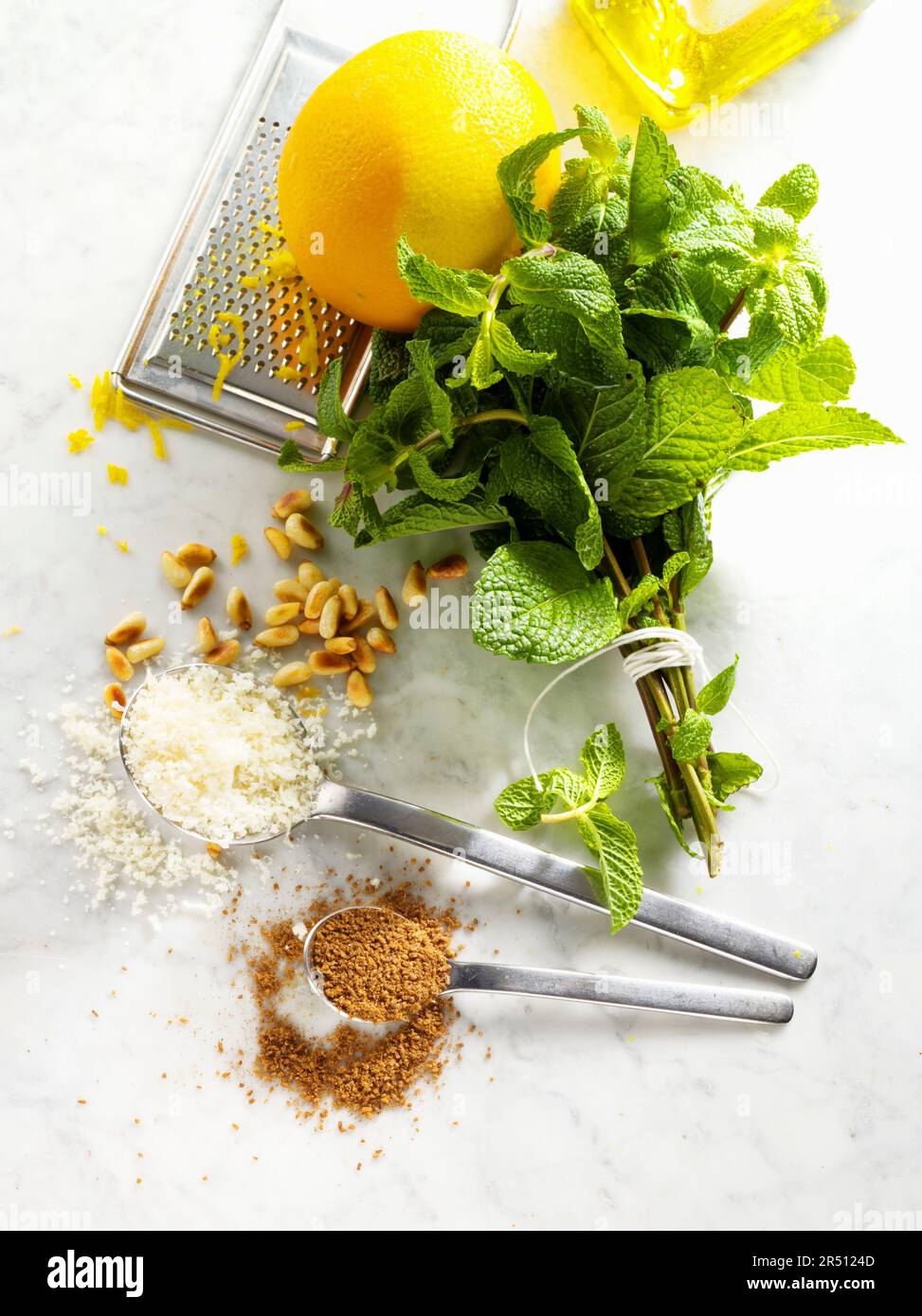 Mint, pine nuts, orange and spices Stock Photo - Alamy