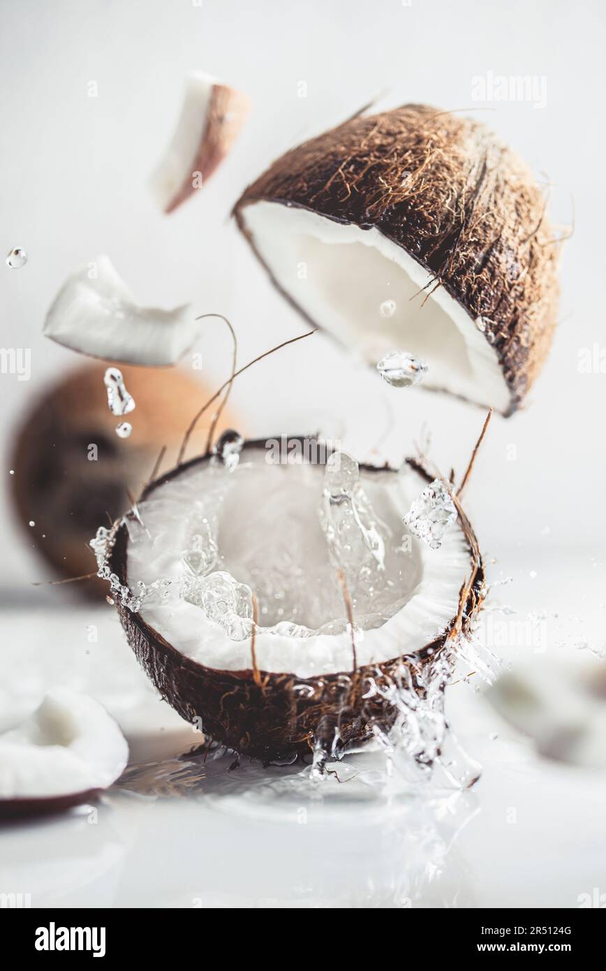Open a coconut to drink the coconut water hi-res stock photography and ...