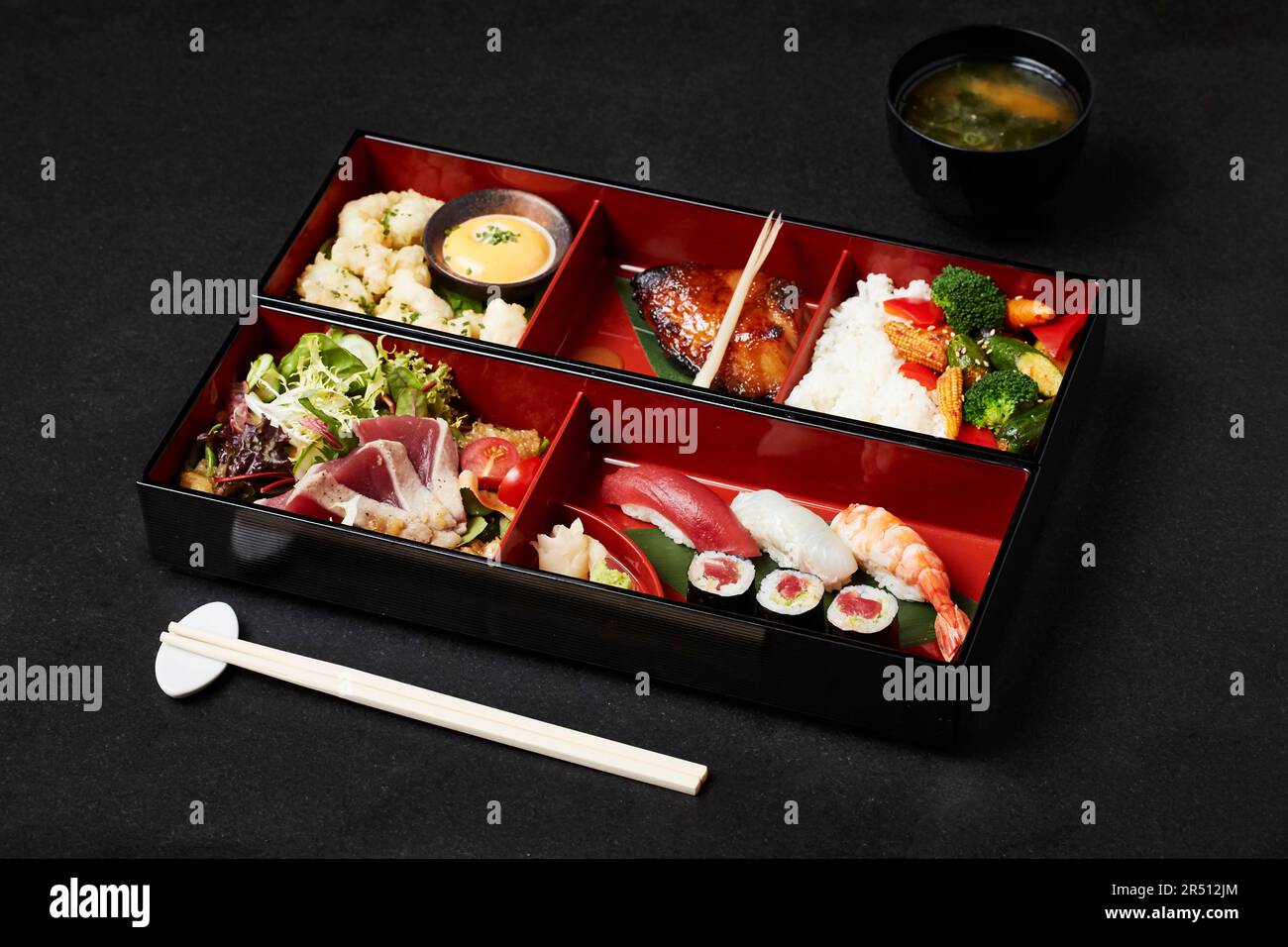 Asian dishes in a bento box Stock Photo - Alamy