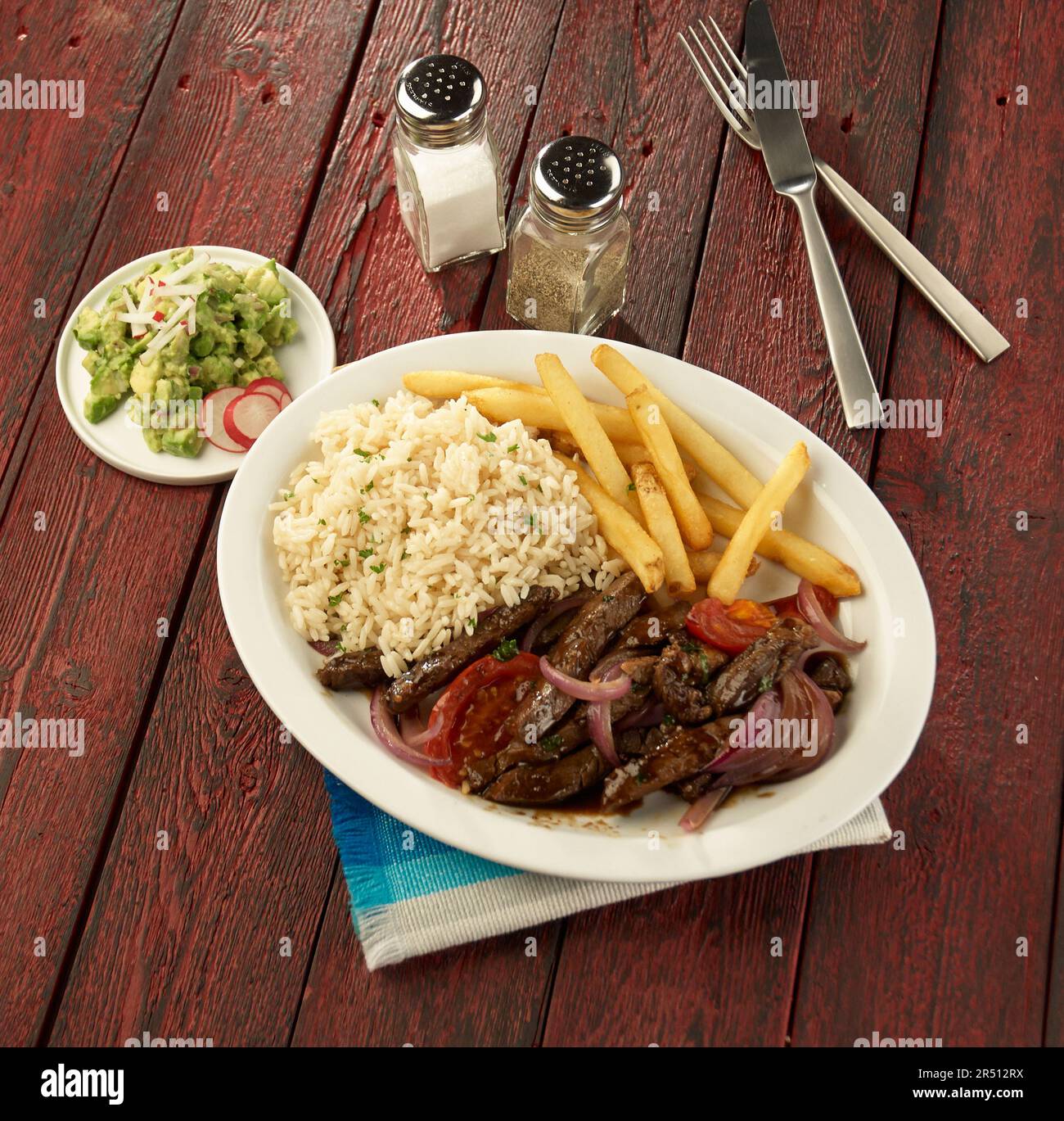 Lomo saltado - peruvian beef in soy sauce Stock Photo - Alamy
