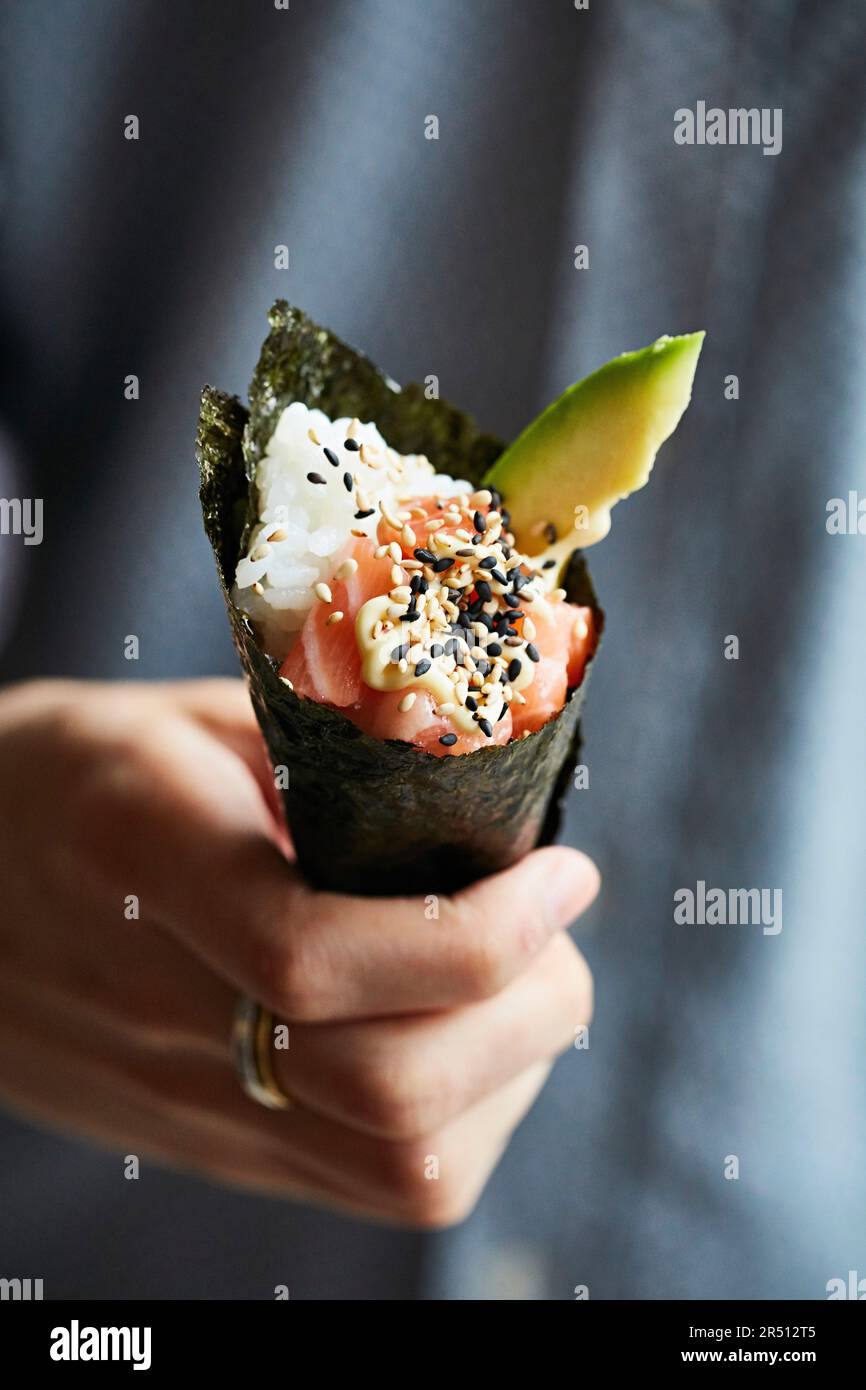 Temaki sushi with salmon and avocado (Japan Stock Photo - Alamy