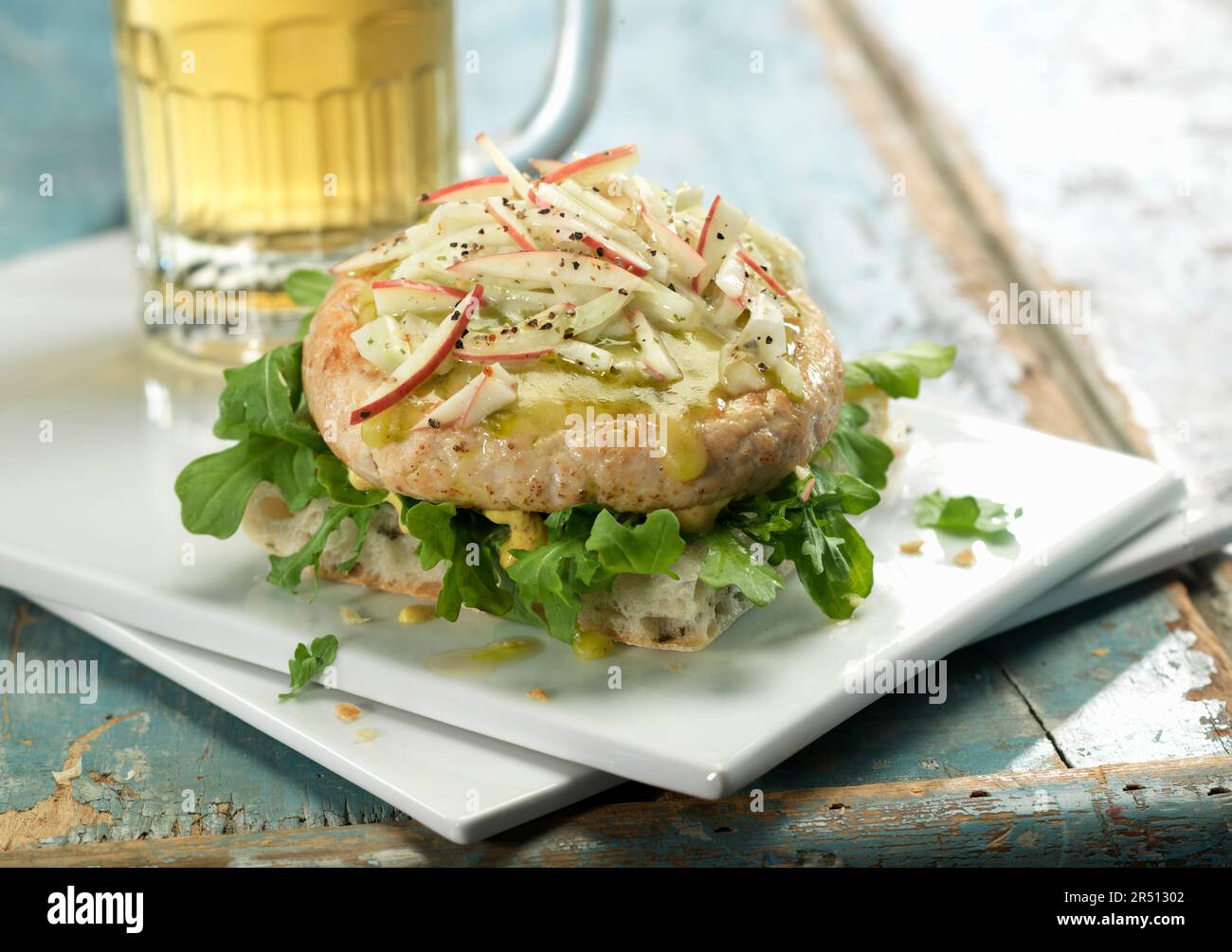 Chicken burger with apple and curry sauce Stock Photo - Alamy
