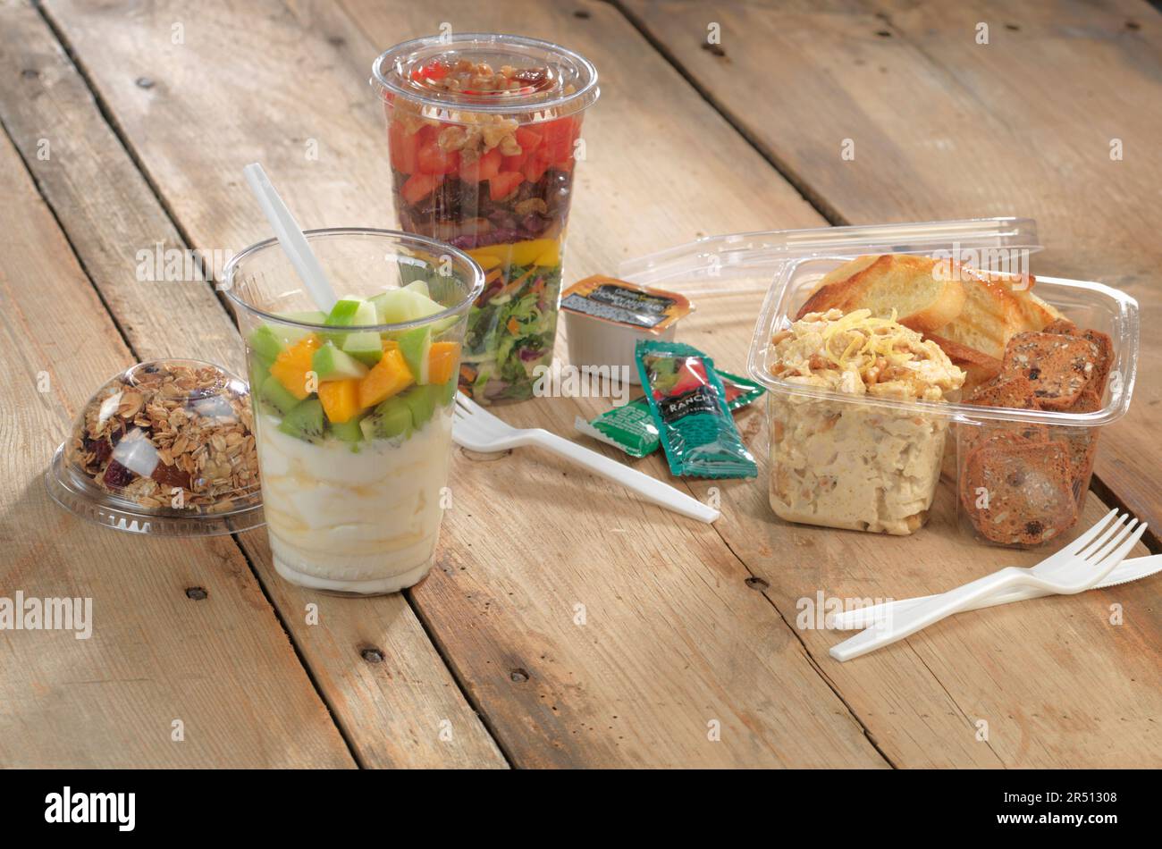 Take out dishes in plastic Stock Photo - Alamy
