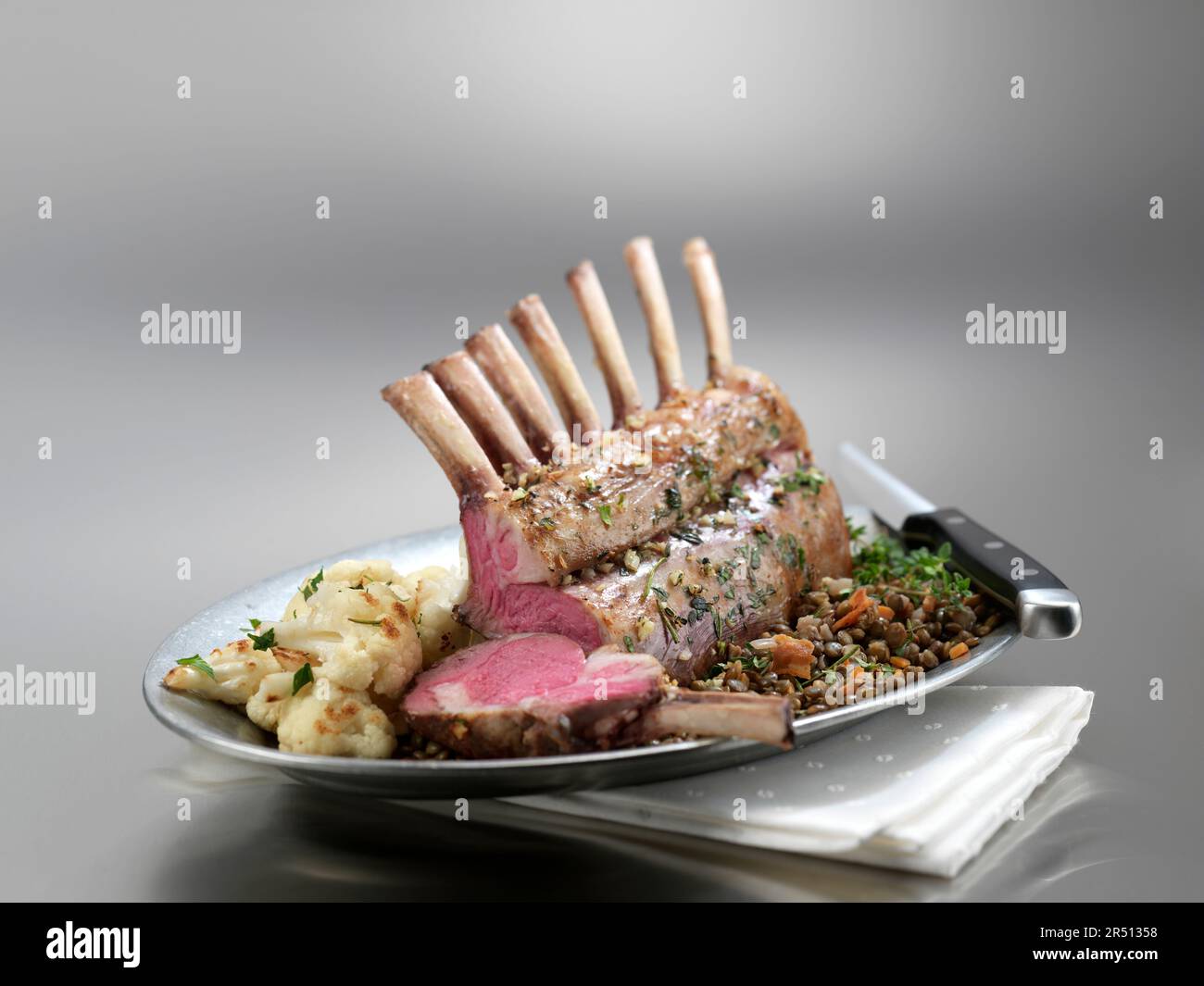 Roasted saddle of lamb hi-res stock photography and images - Alamy