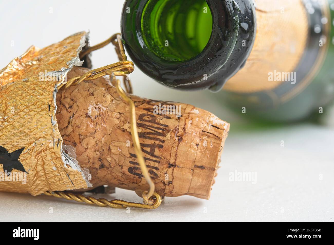 Champagne bottle with a cork (close up Stock Photo - Alamy