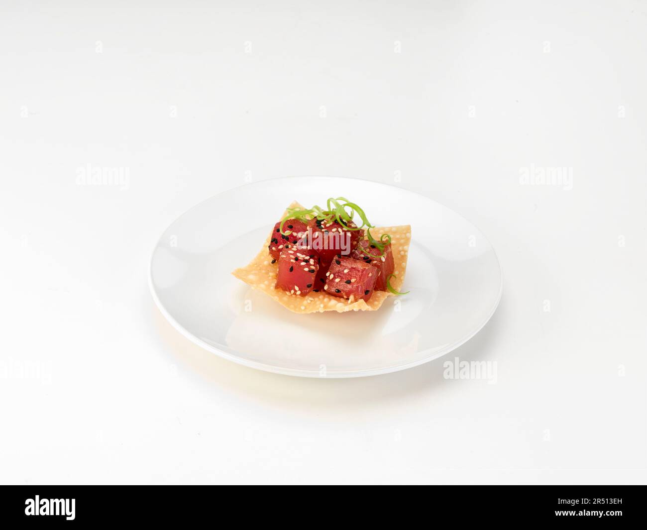 Tuna poke cubes Stock Photo - Alamy