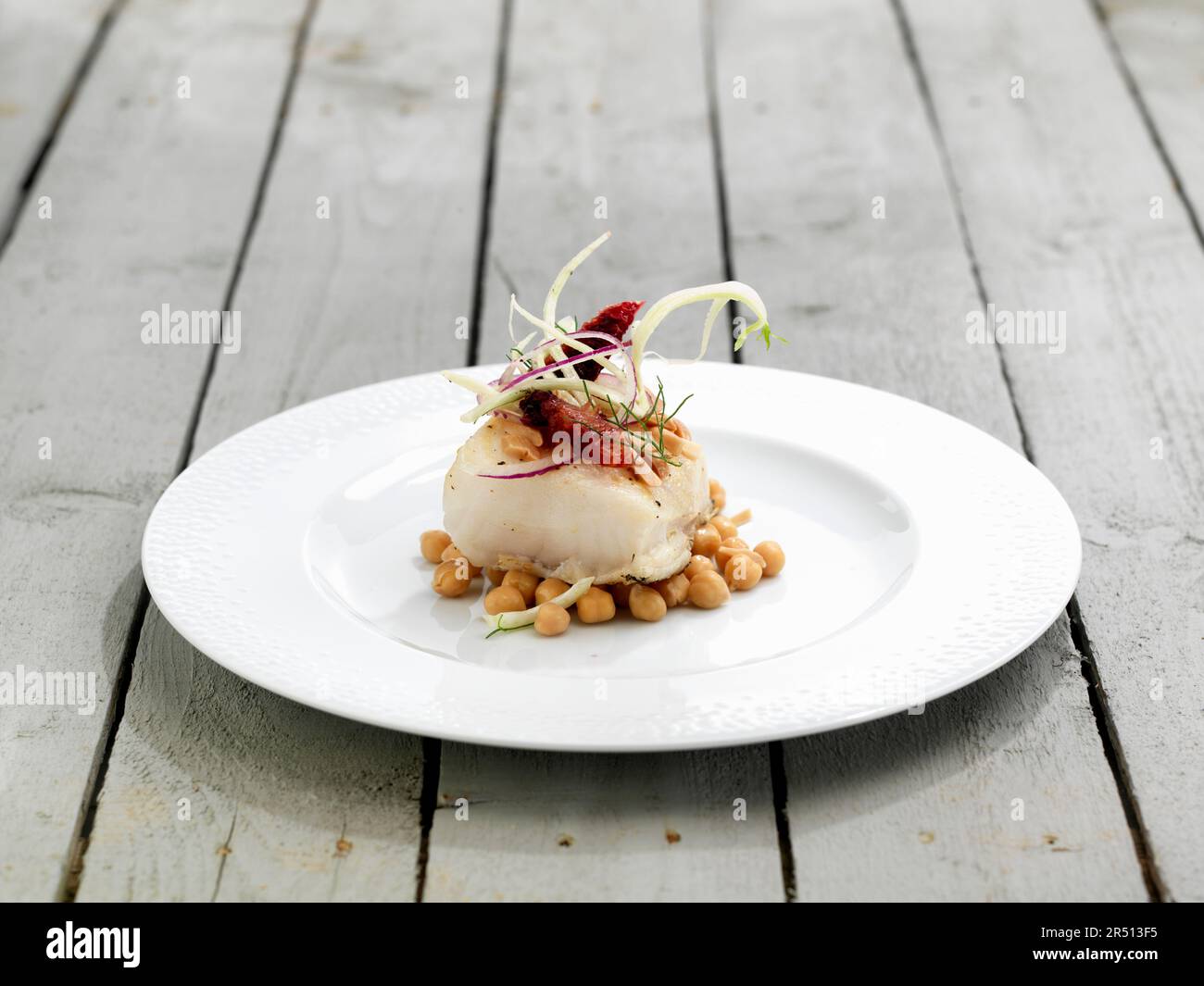 Venetian stone bream on chickpeas Stock Photo - Alamy