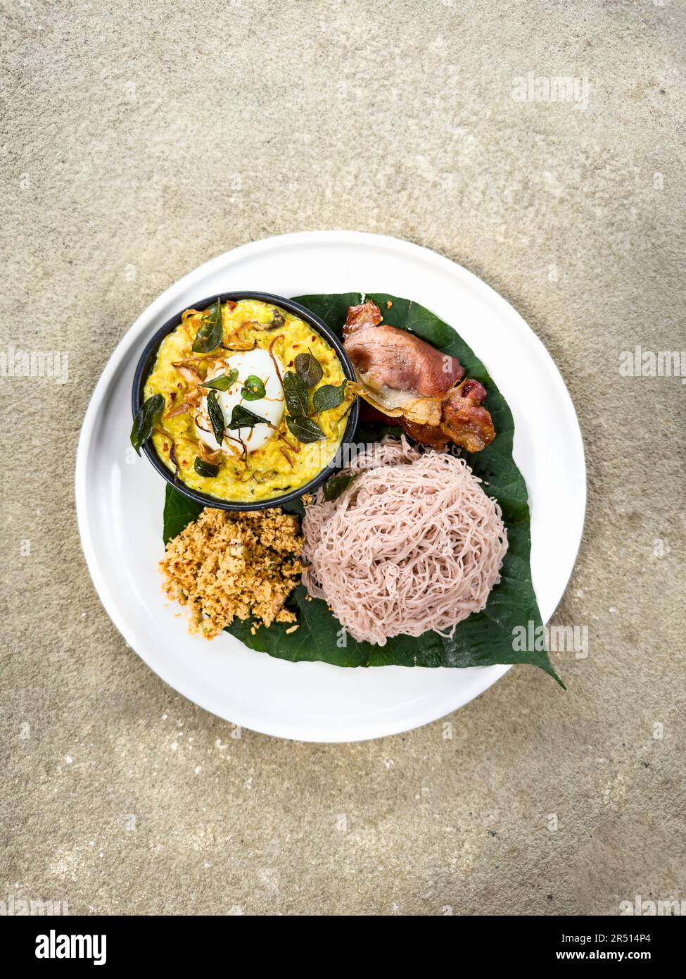 String hoppers, dahl with boiled egg, coconut sambal and fried bacon ...