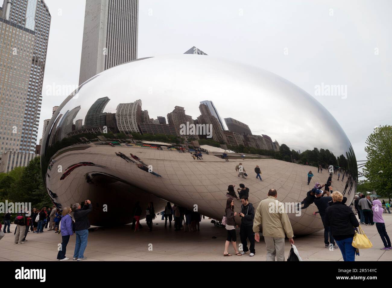 USA, Illinois, Chicago, reflections of people in 'The Cloud' (by Anish Kapoor), aka The Bean ...