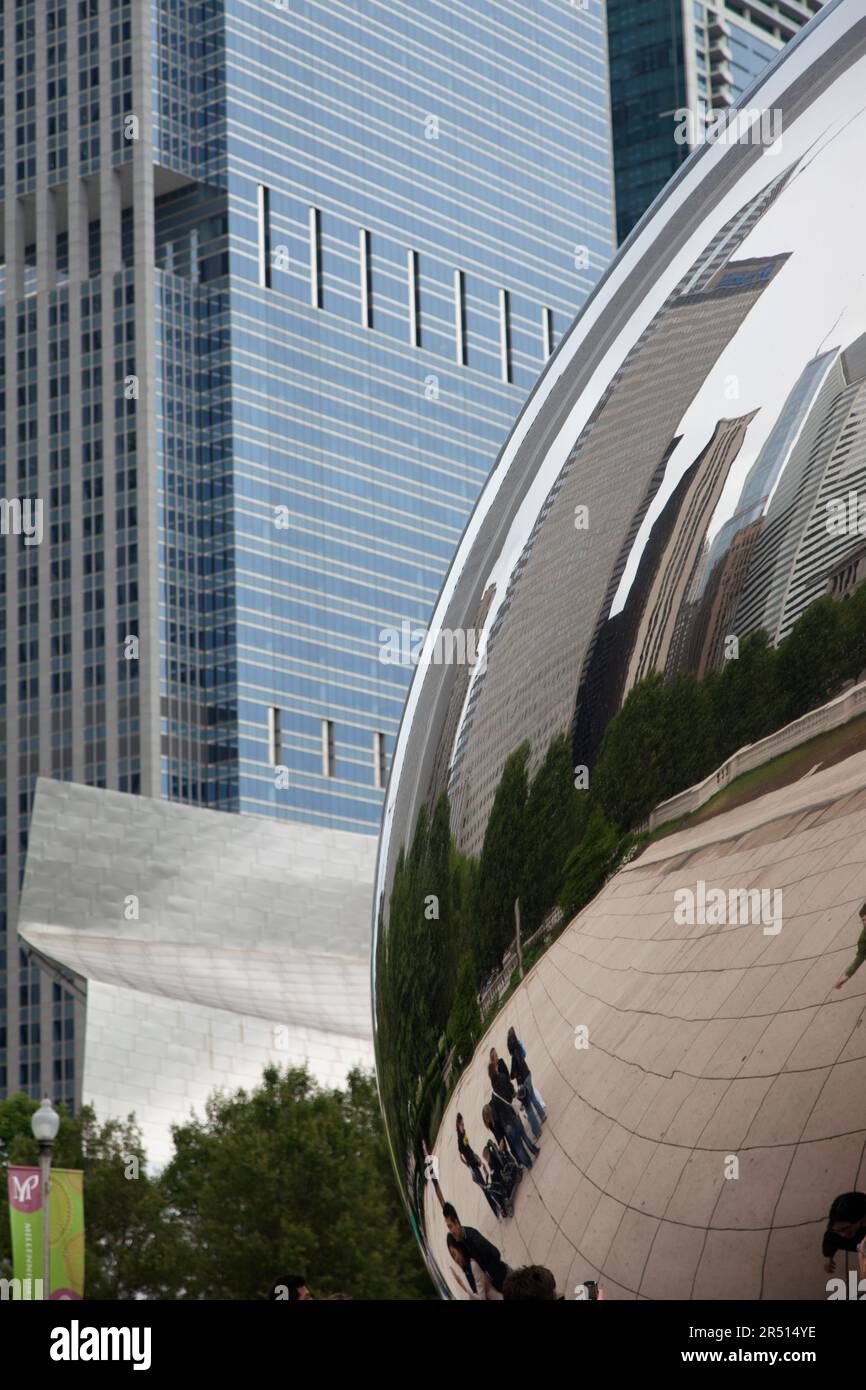 USA, Illinois, Chicago, reflections of people in 'The Cloud' (by Anish Kapoor), aka The Bean ...