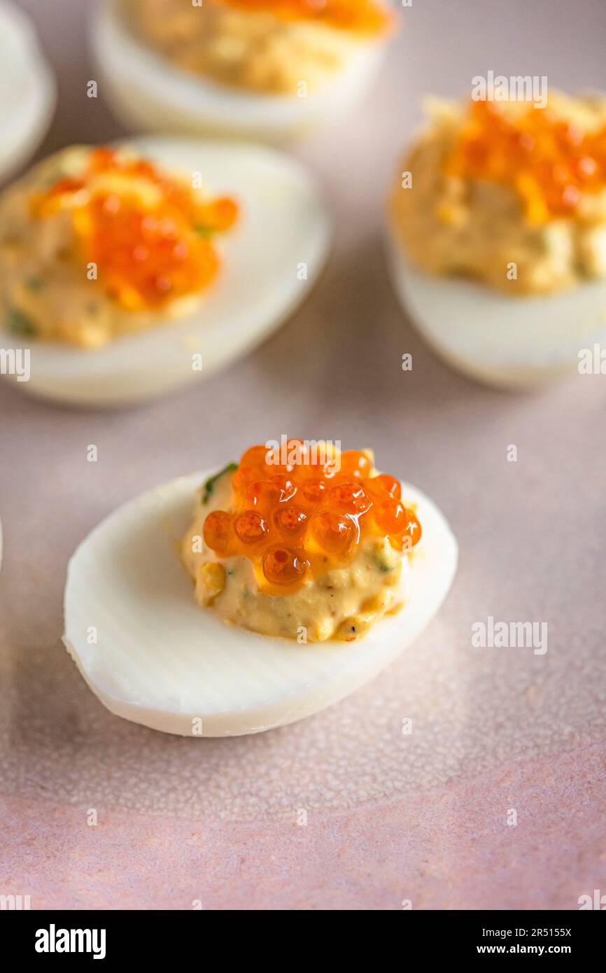 Devilled eggs (boiled, filled eggs) with caviar Stock Photo - Alamy