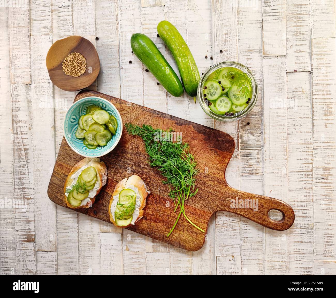 Cream cheese bread with pickled cucumber Stock Photo - Alamy