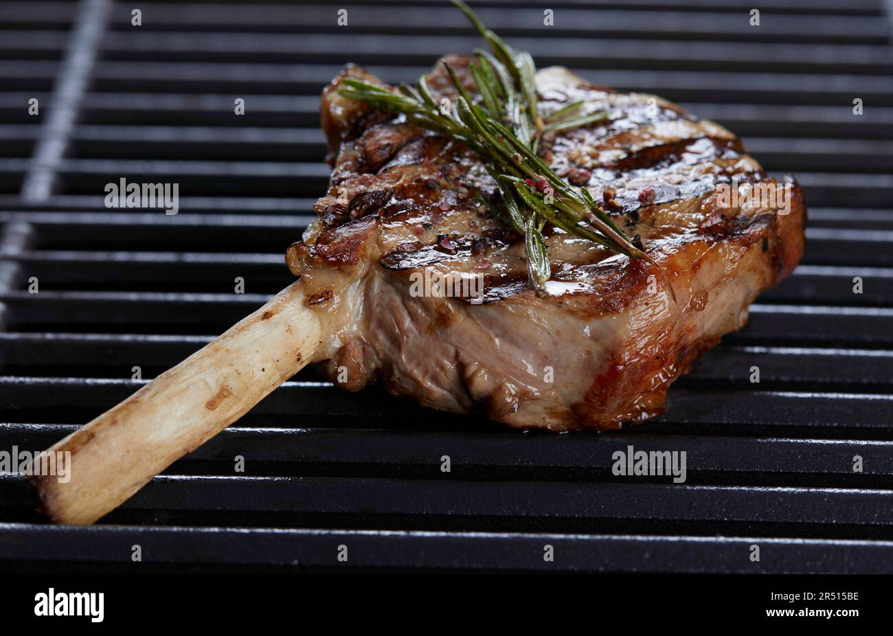 Grilled pork chop on the barbecue grill Stock Photo - Alamy