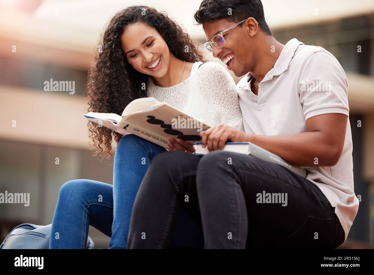 Reading, university and students with book on campus for learning ...