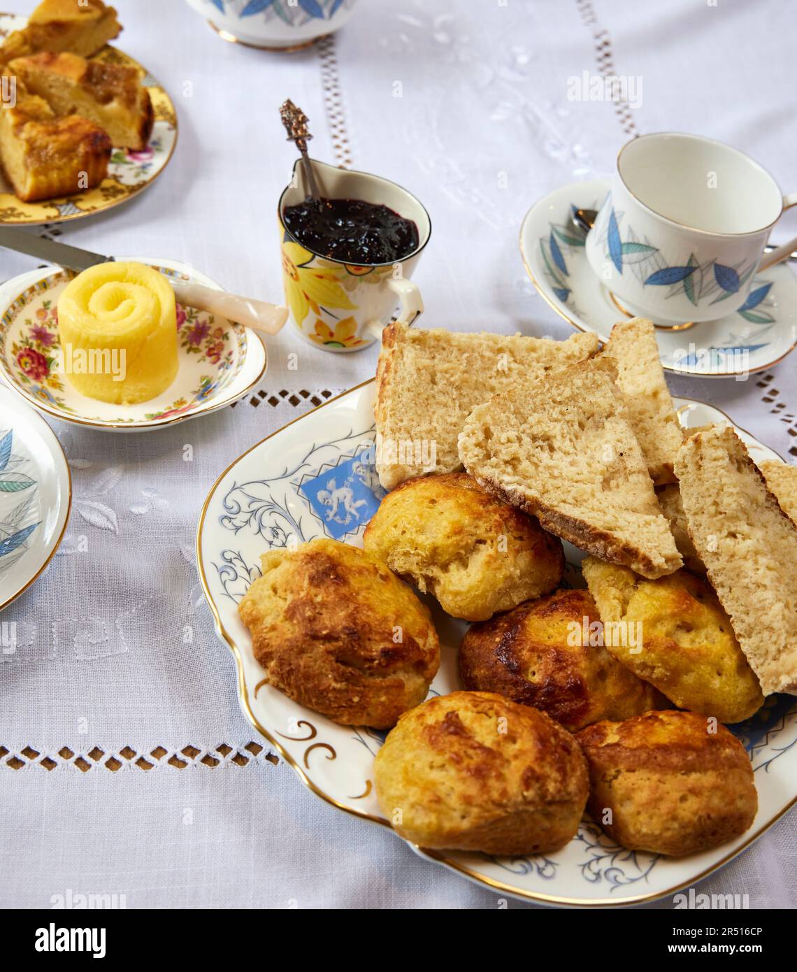 Breakfast table with scones and bread Stock Photo - Alamy