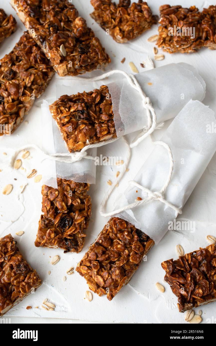 Healthy homemade oatmeal bars with sultanas and honey Stock Photo - Alamy