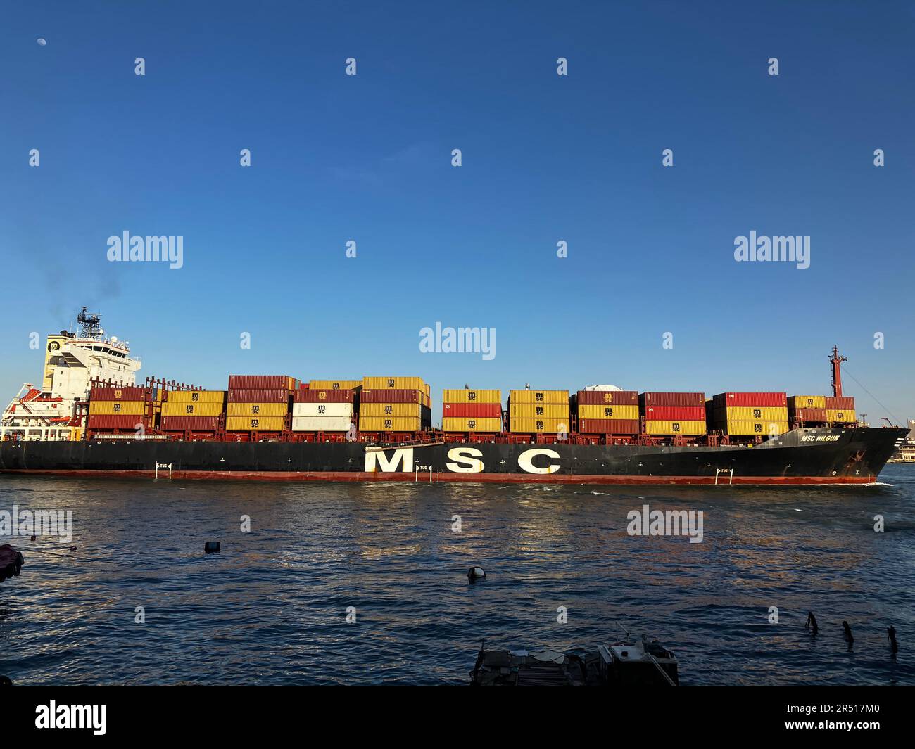 Ship crossing the Suez canal in Portsaid city Stock Photo - Alamy