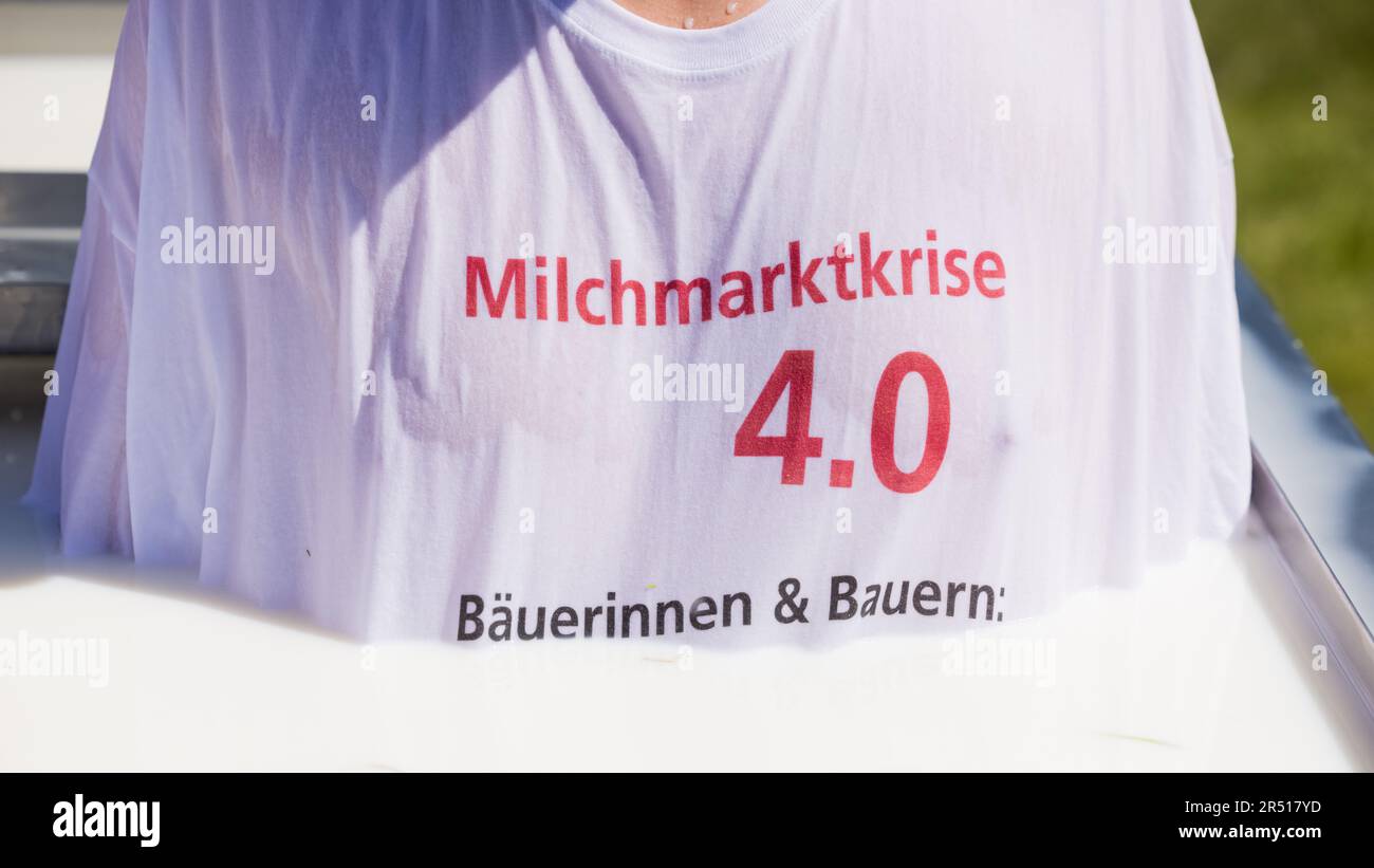 Duesseldorf, Germany. 31st May, 2023. A dairy farmer bathes in a milk ...