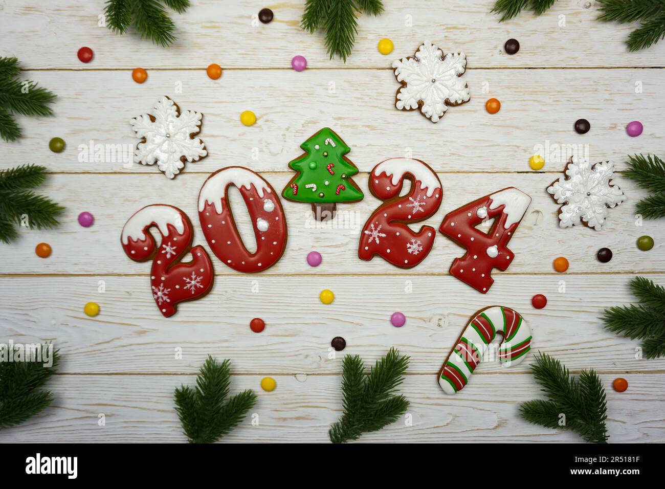 Gingerbread figures 2024 are laid out on a wooden table. High quality ...