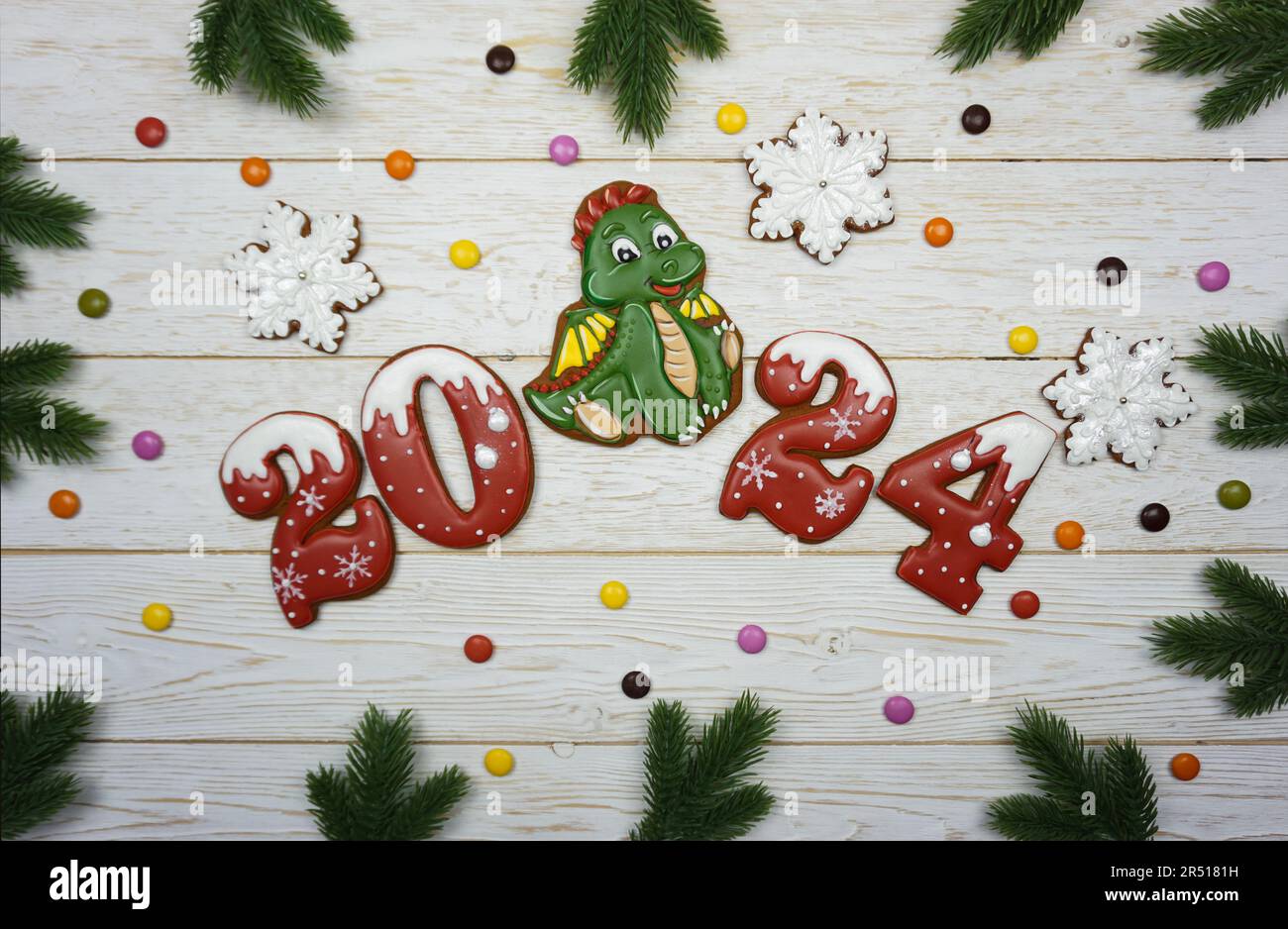 Gingerbread figures 2024 are laid out on a wooden table. High quality ...