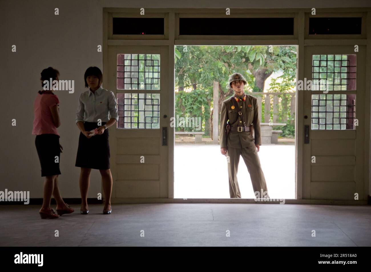 north korean orphans in an orphanage in front of the pictures of the ...