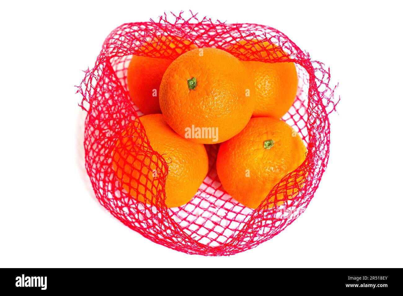 Close-up view an opened medium-sized red mesh bag with fresh and juicy ...