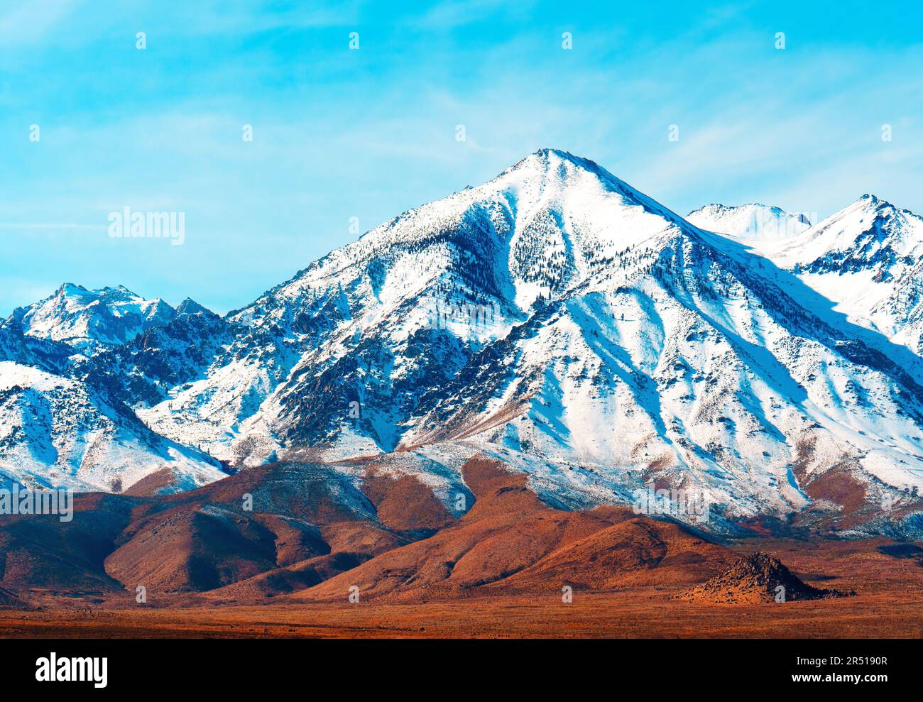 Snowy Mount Whitney peak towering over the Sierra Nevada mountain range ...