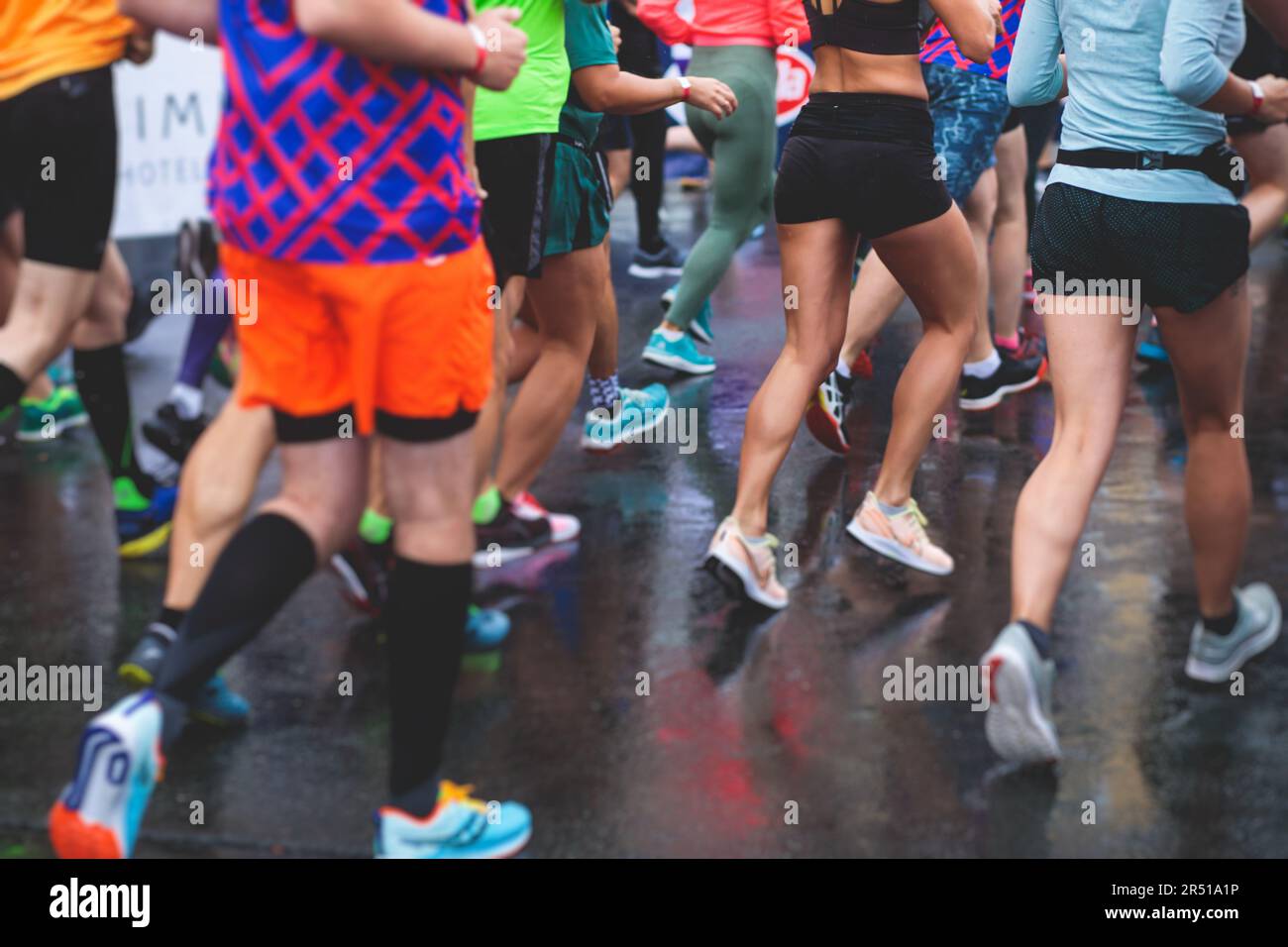 Marathon runners crowd, participants start running the half-marathon in ...