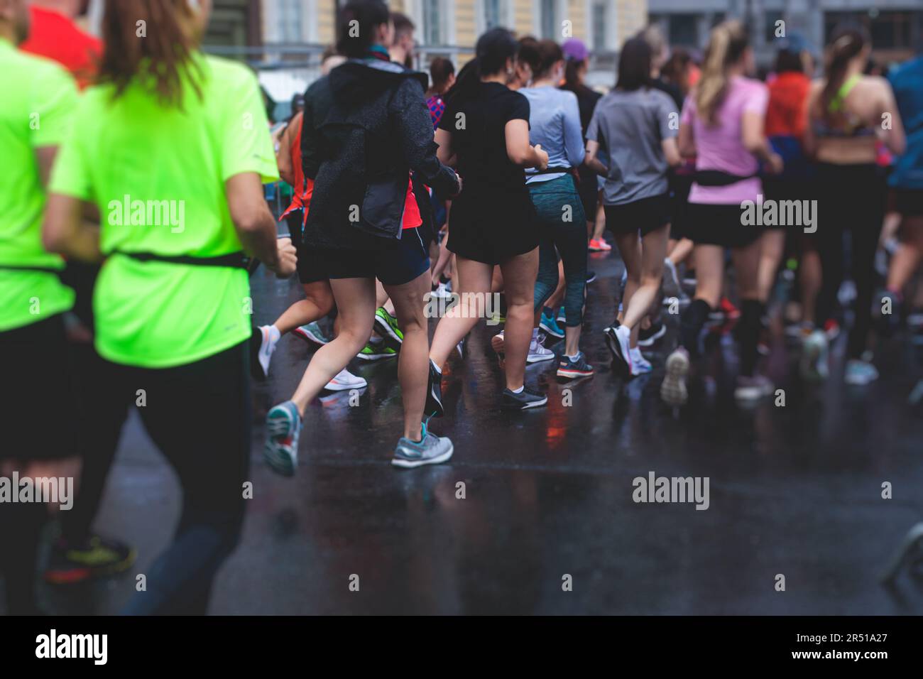 Marathon runners crowd, participants start running the half-marathon in ...
