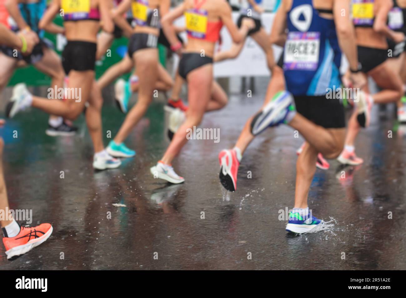 Marathon runners crowd, participants start running the half-marathon in ...