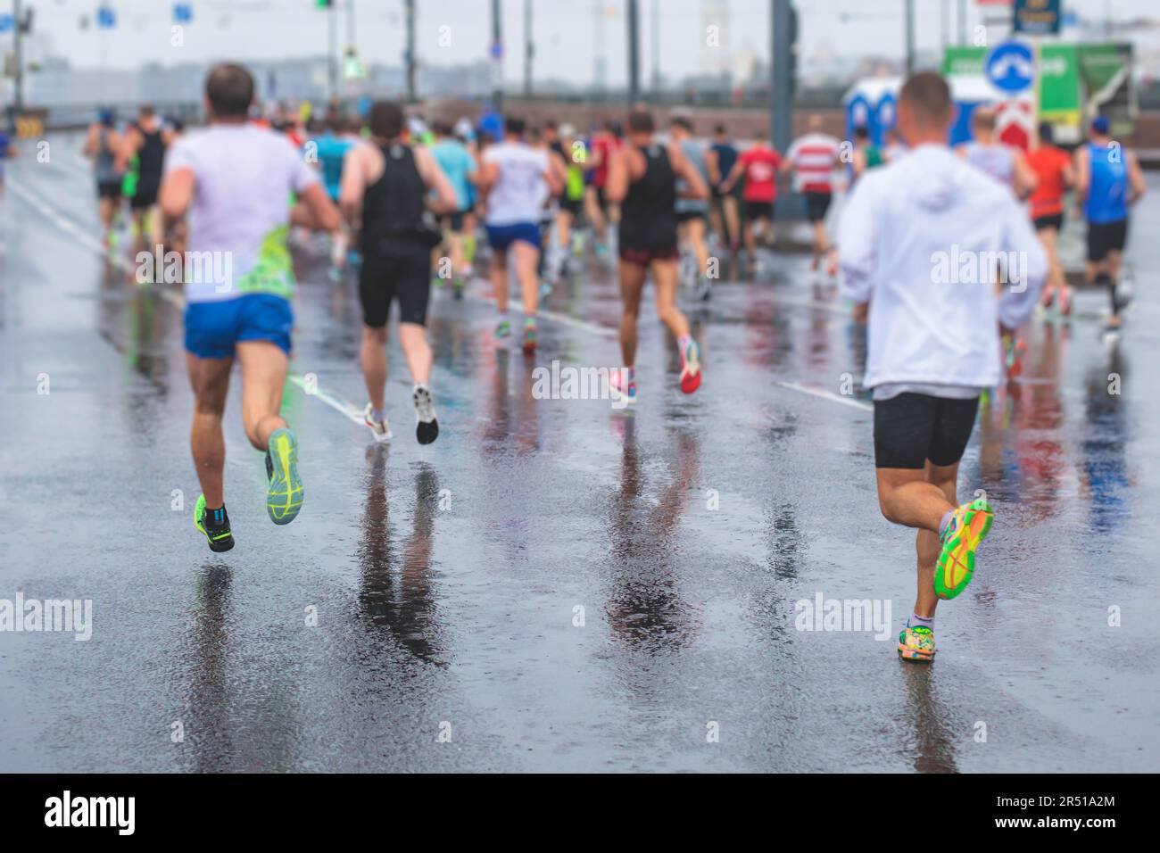 Marathon runners crowd, participants start running the half-marathon in ...