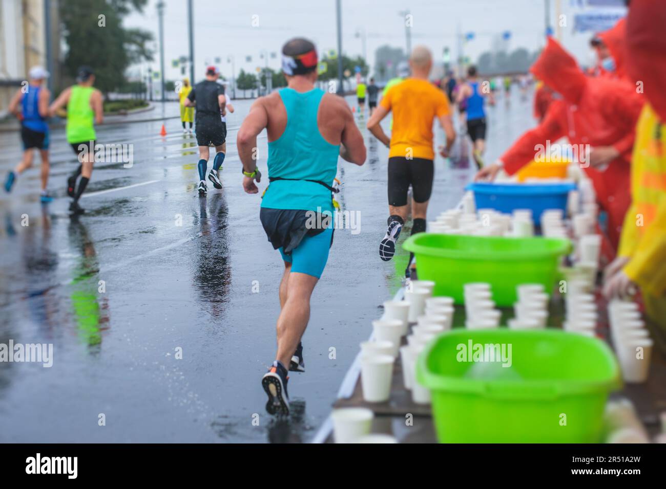 Marathon runners crowd, participants start running the half-marathon in ...