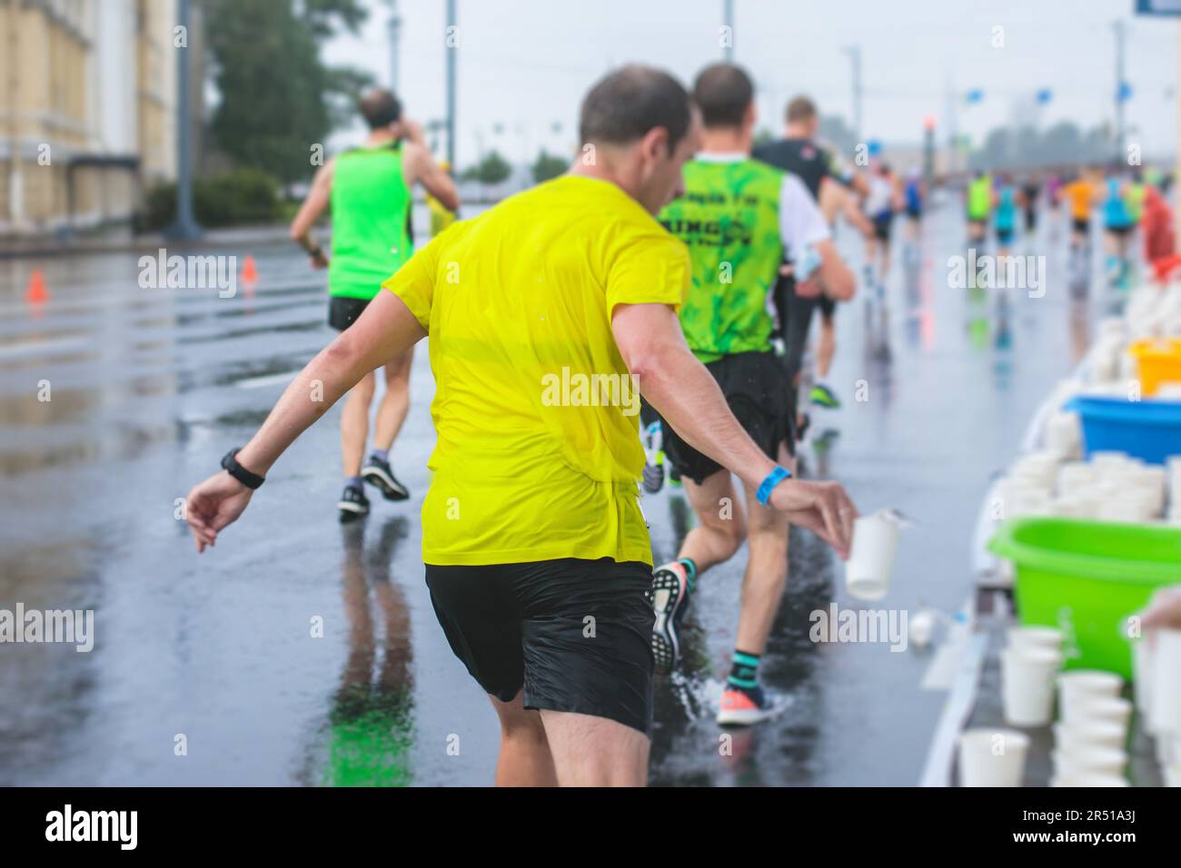 Marathon runners crowd, participants start running the half-marathon in ...
