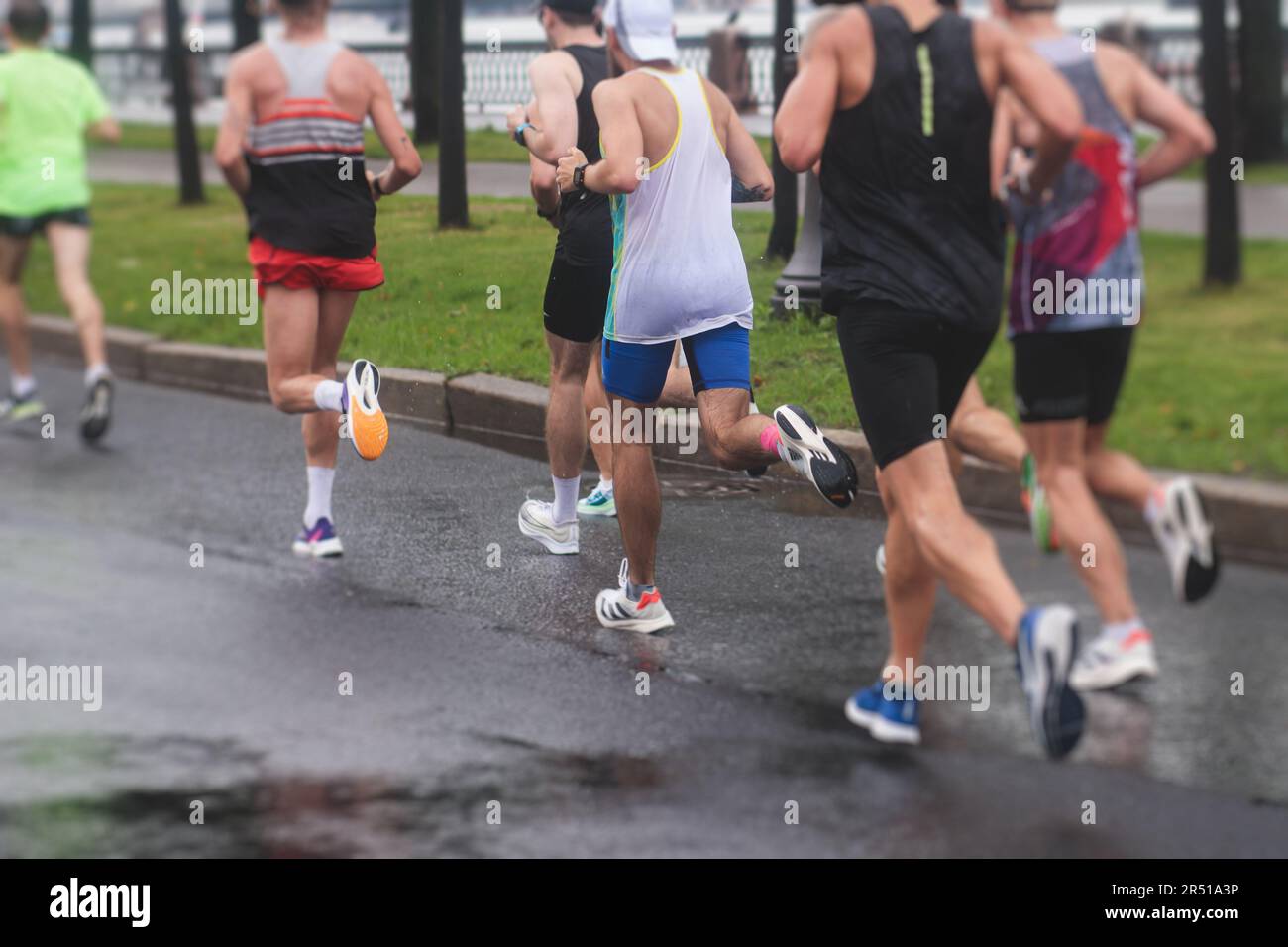 Marathon runners crowd, participants start running the half-marathon in ...