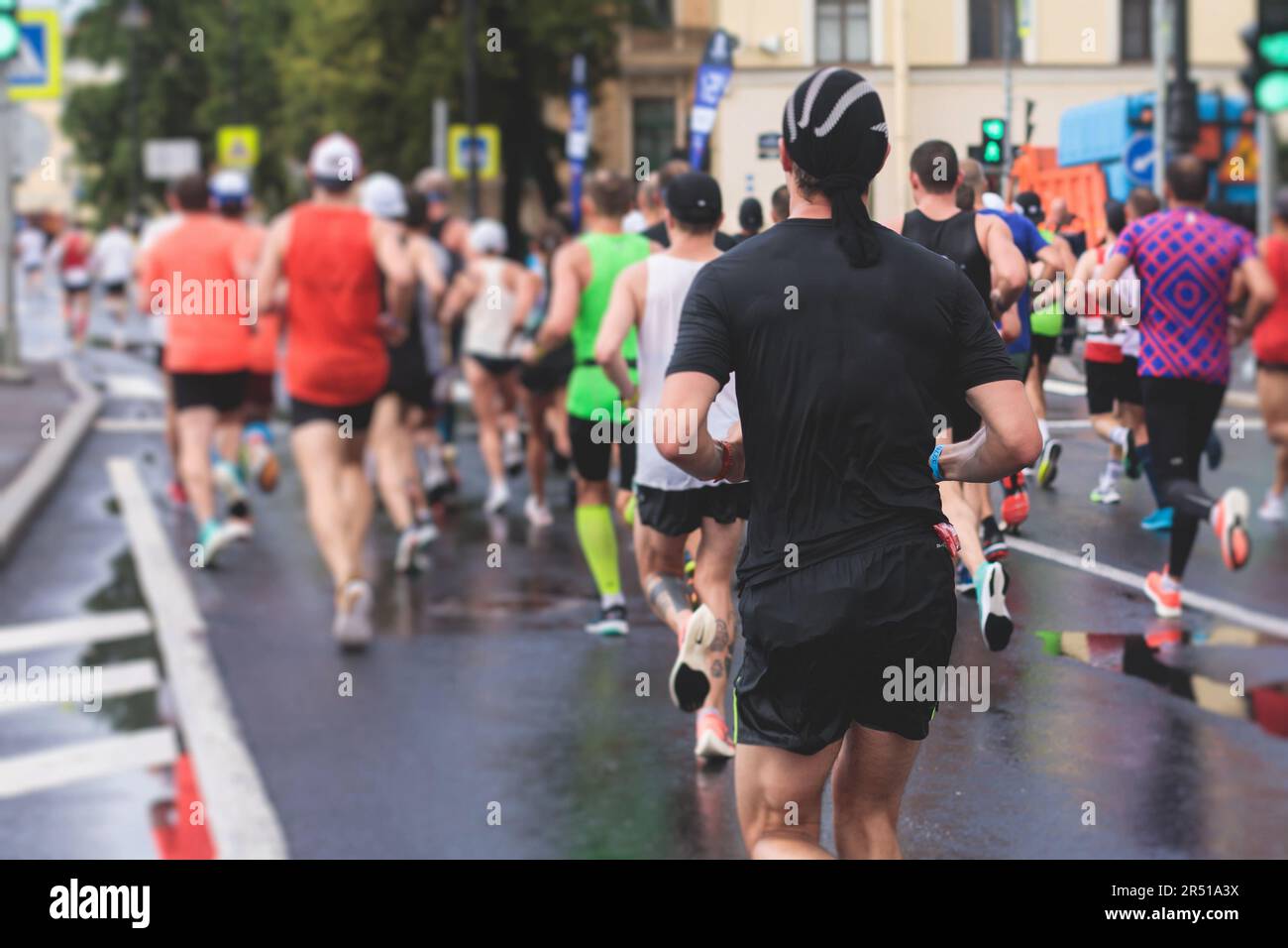 Marathon runners crowd, participants start running the half-marathon in ...