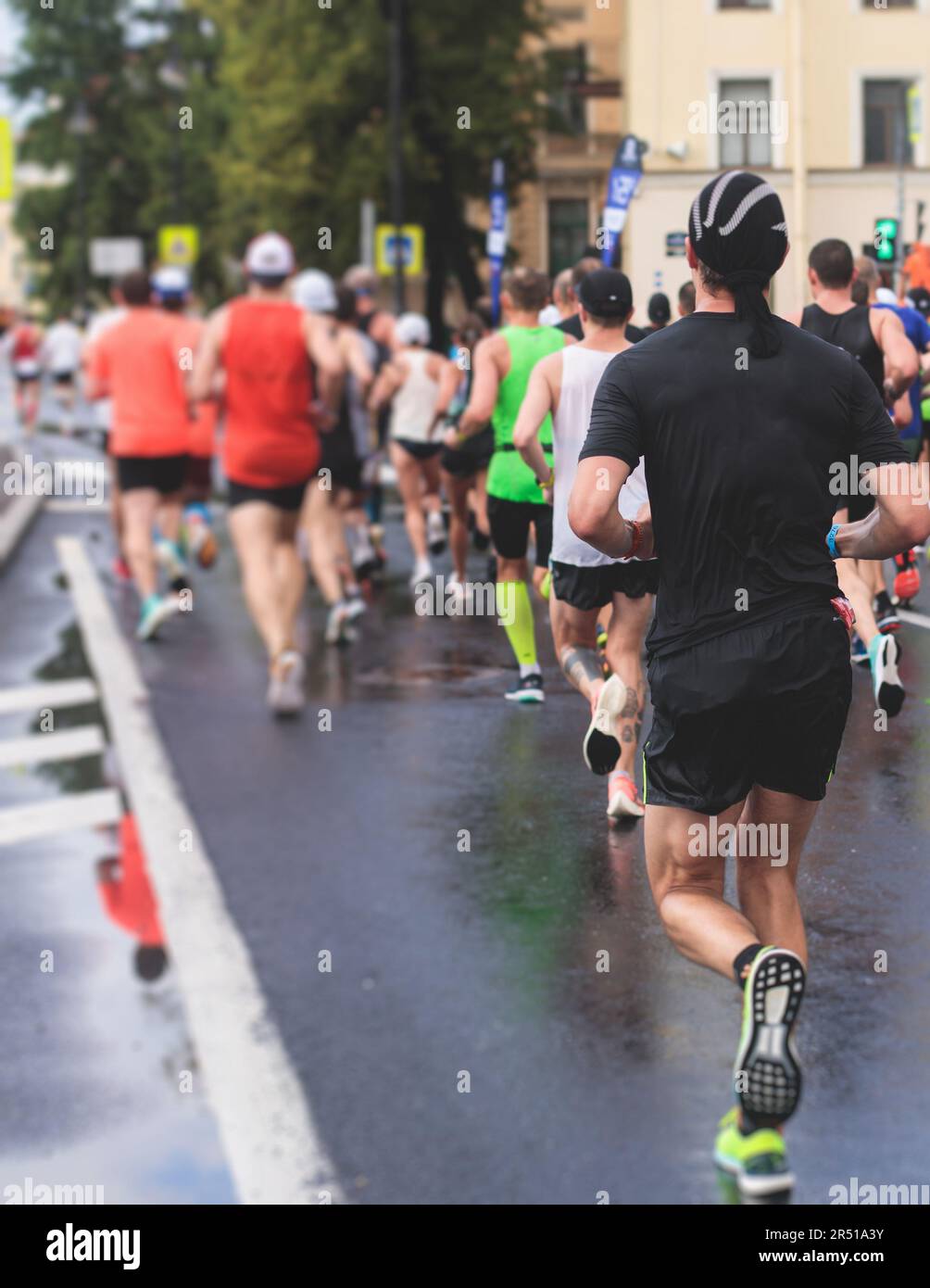 Marathon runners crowd, participants start running the half-marathon in ...