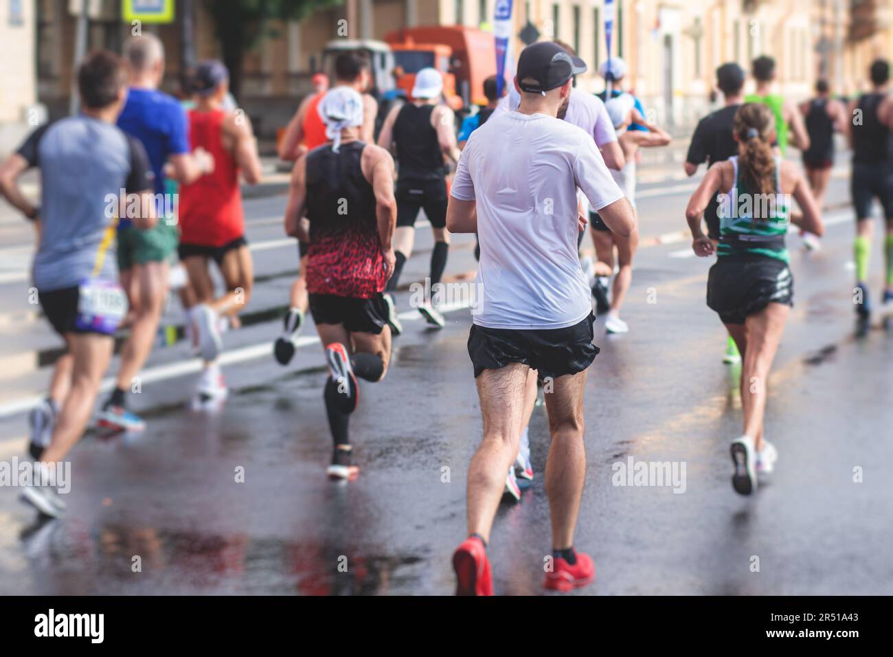 Marathon runners crowd, participants start running the half-marathon in ...