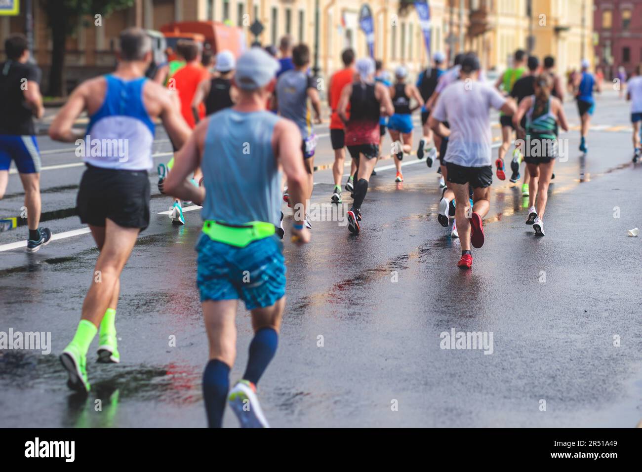 Marathon runners crowd, participants start running the half-marathon in ...