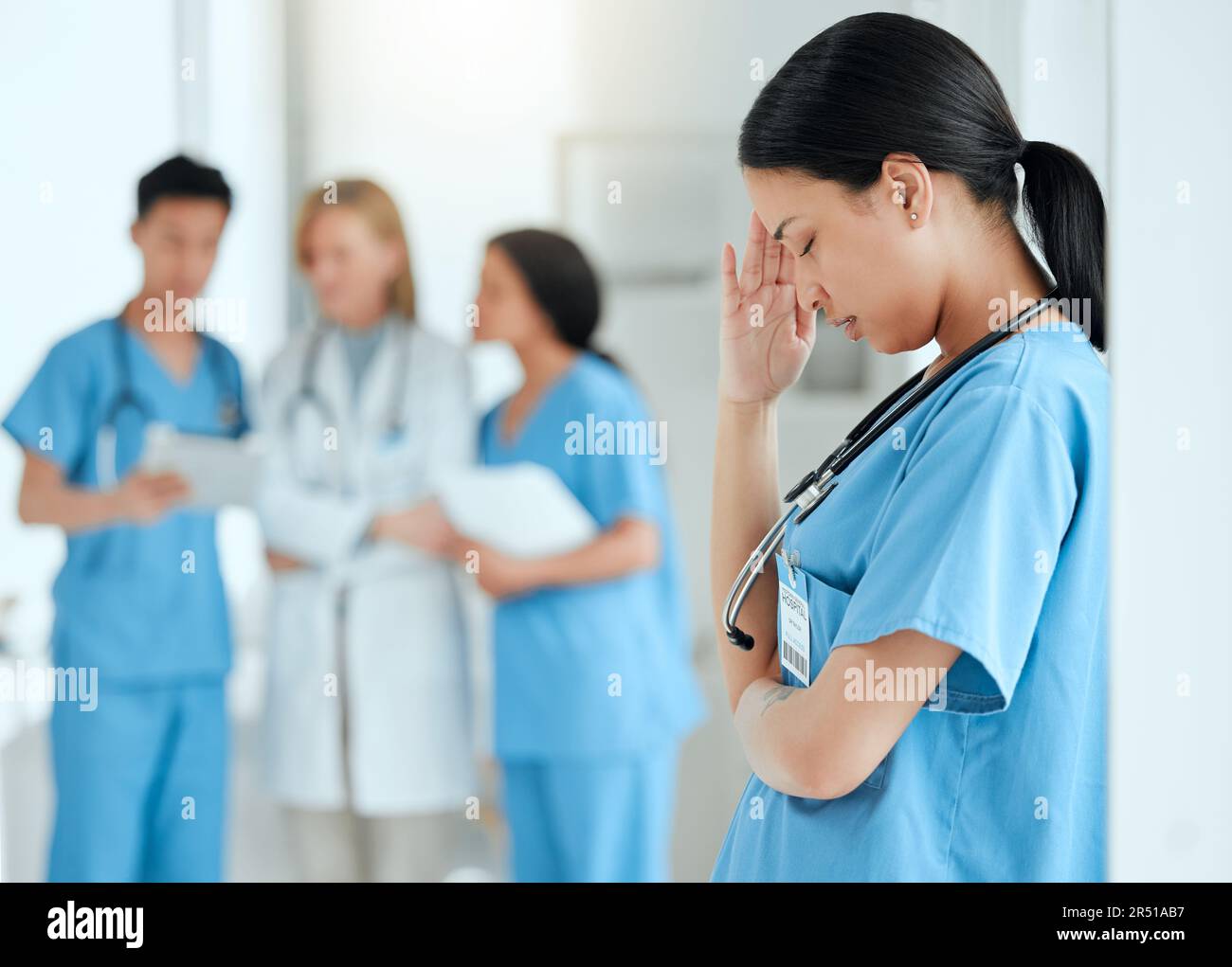 Headache, stress or sad nurse in hospital with burnout, anxiety or ...