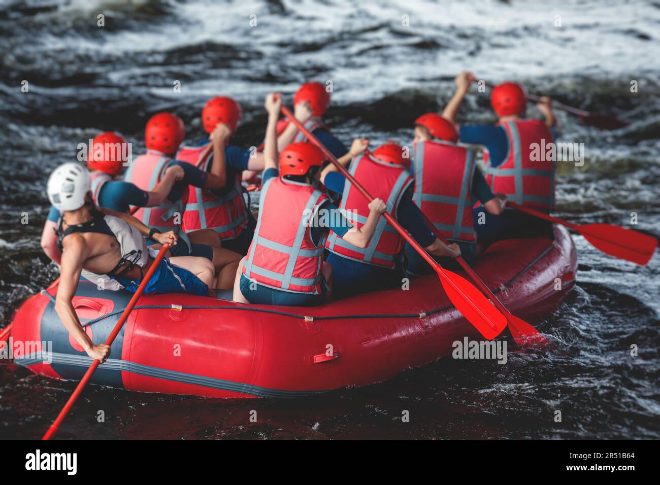 Red raft boat during whitewater rafting extreme water sports on water ...