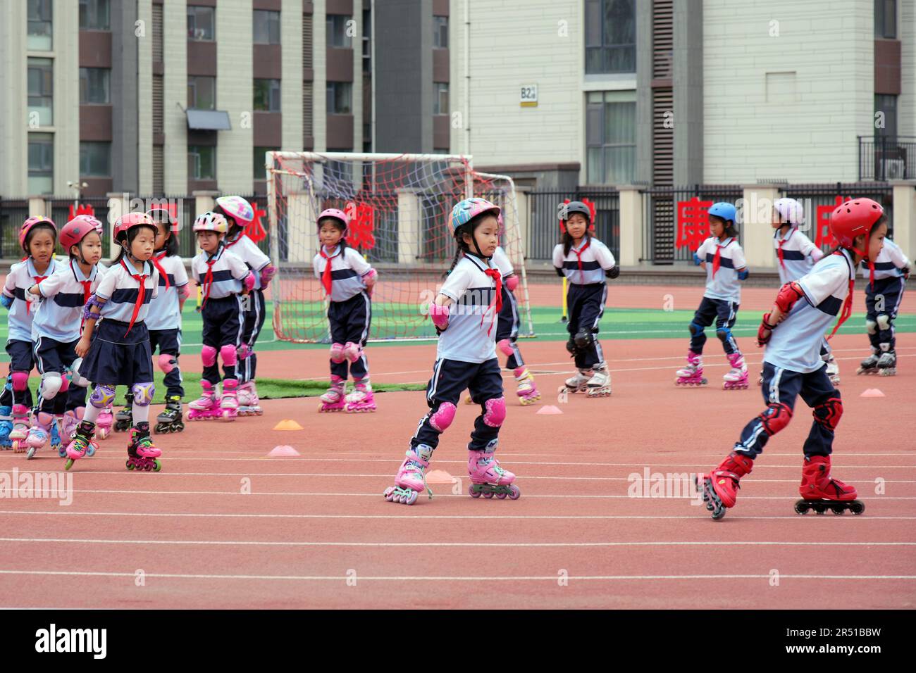 YANTAI, CHINA - MAY 30, 2023 - Primary school students practice roller ...