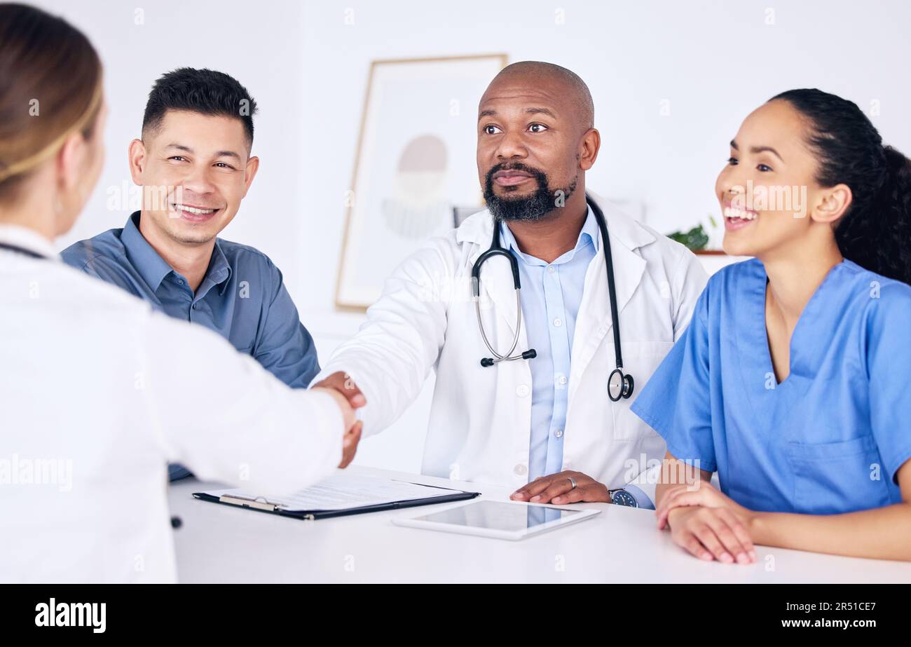 Handshake, teamwork or happy doctors in meeting for success, medical ...