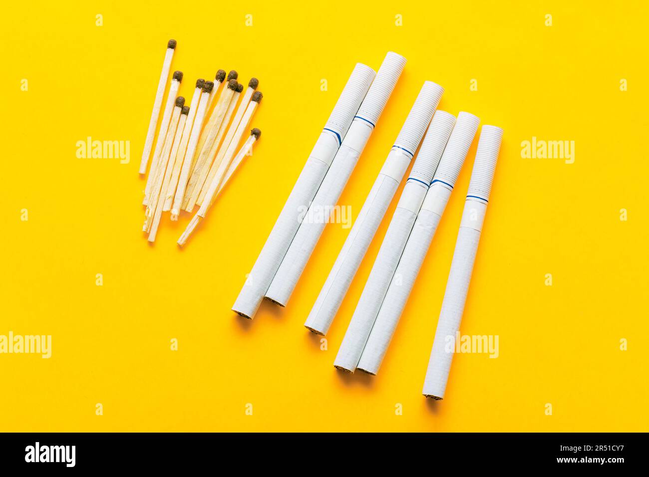 Cigarette and matches studio shot . Tobacco cigarette and wooden ...