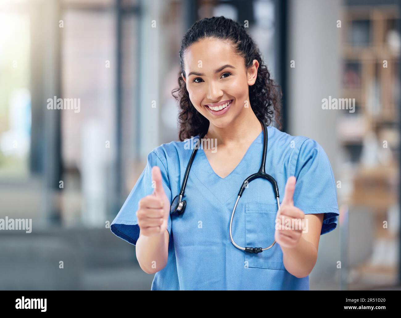 Happy woman, doctor and portrait with thumbs up for winning, success or good job in healthcare ...