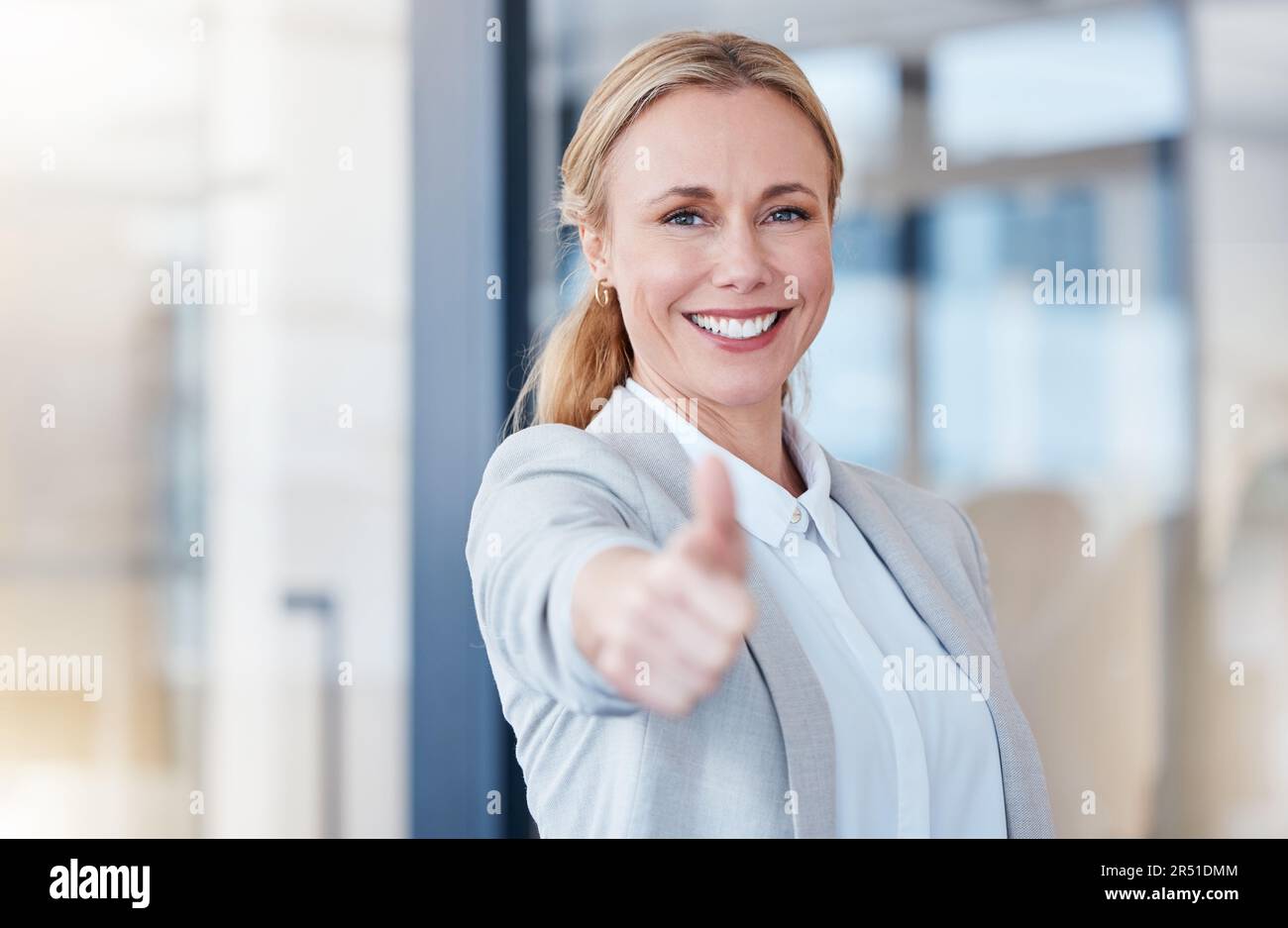 Business woman, portrait smile and thumbs up for winning, success or ...