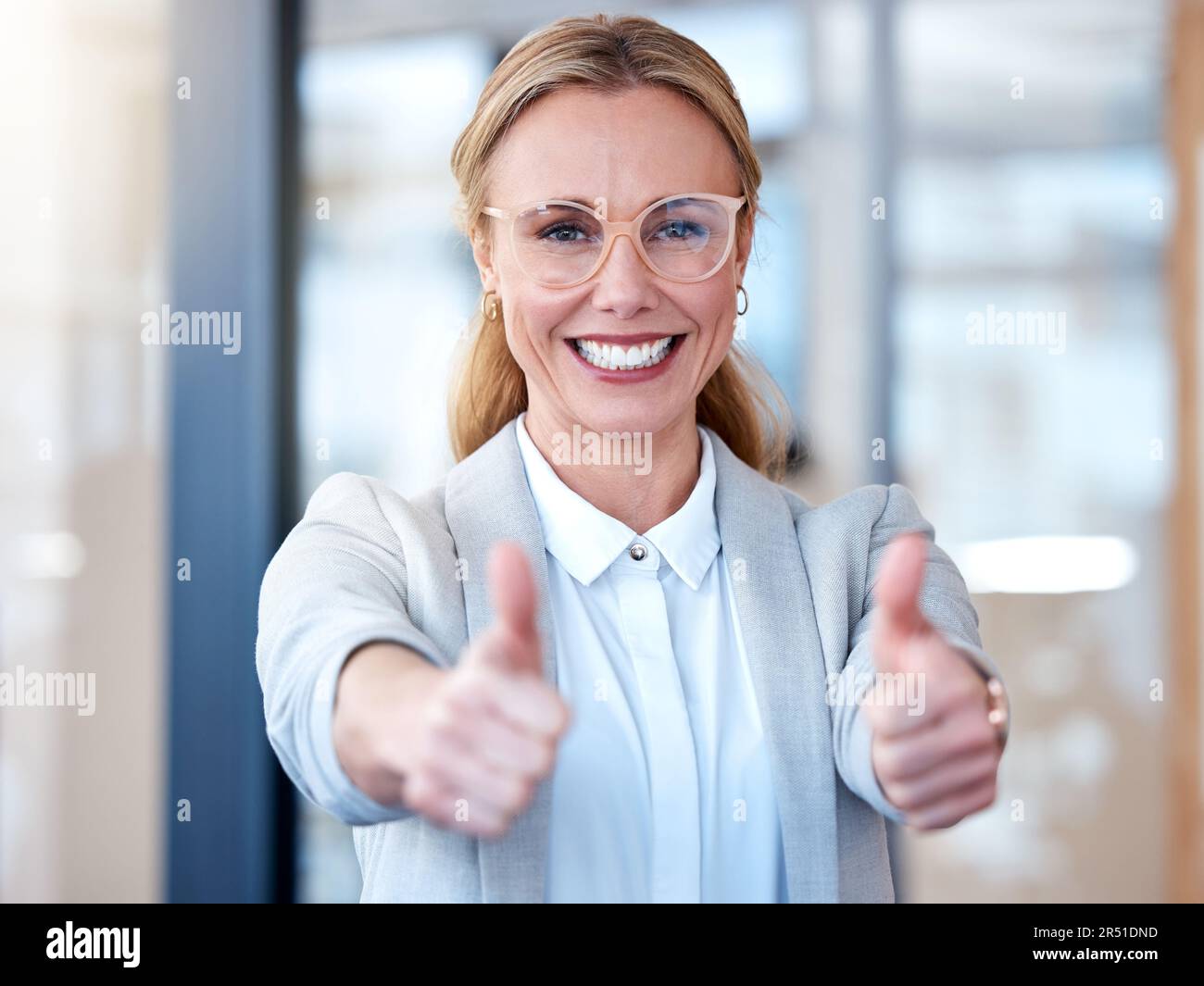 Business woman, portrait smile and thumbs up for thank you, success or ...