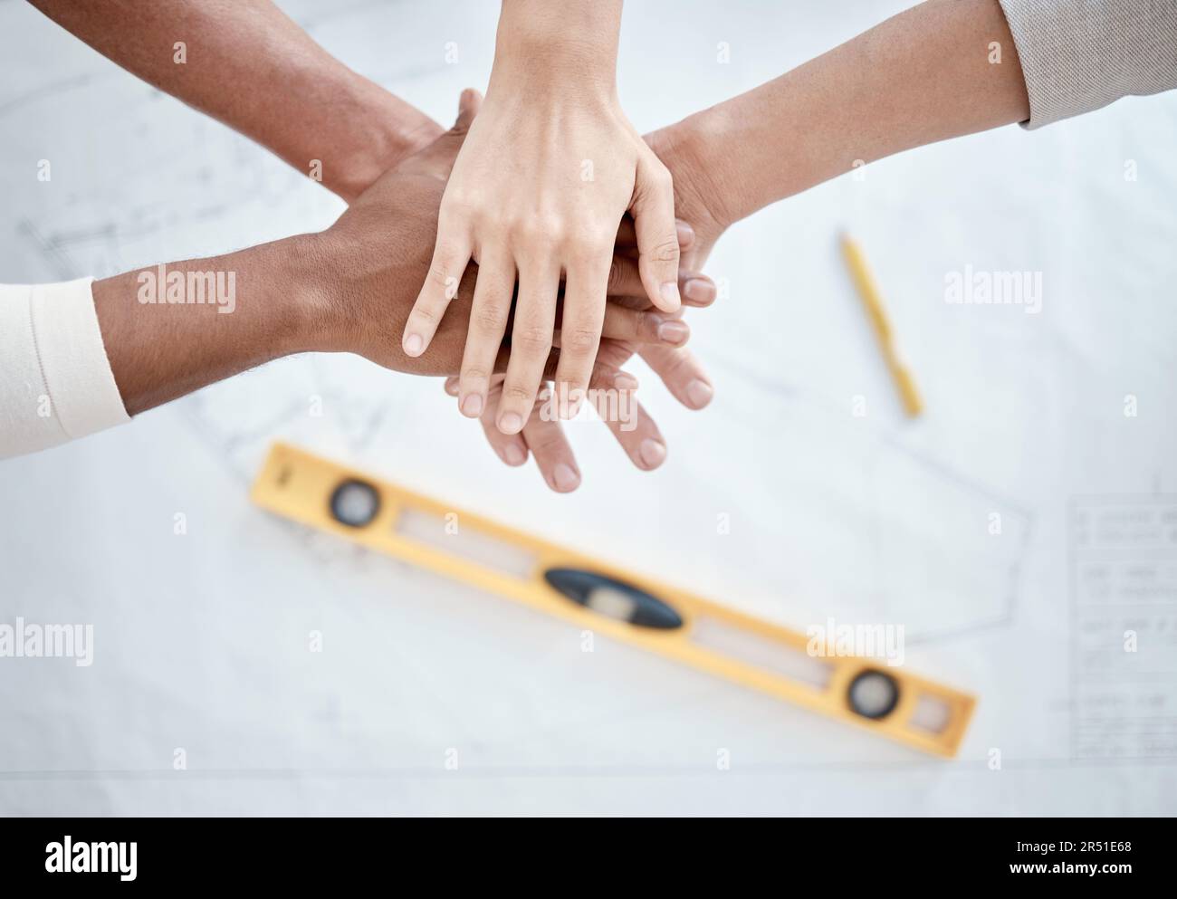 Hands stacked, engineering and people teamwork, collaboration or ...