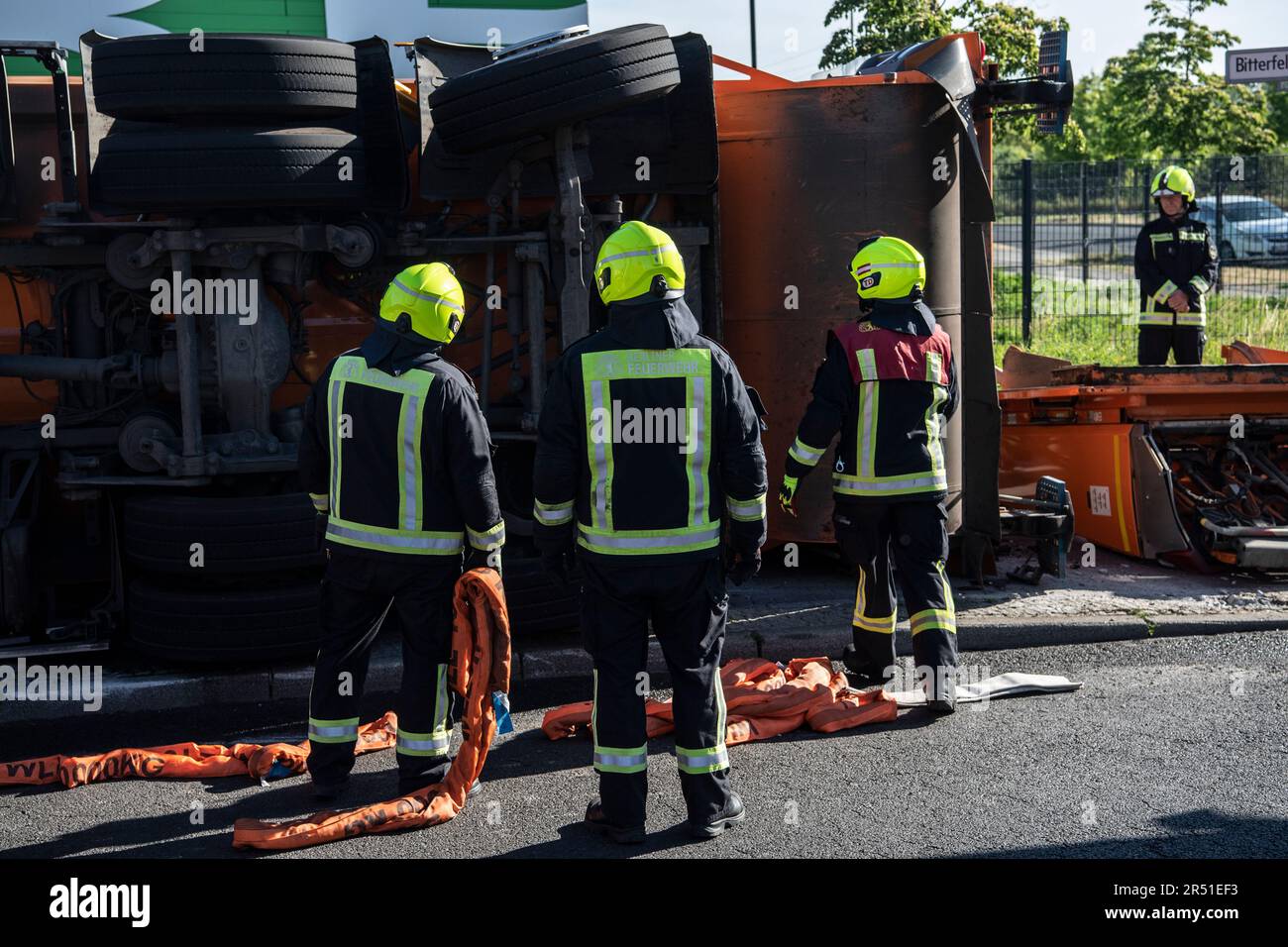 Berlin, Germany. 31st May, 2023. Firefighters stand by an overturned ...