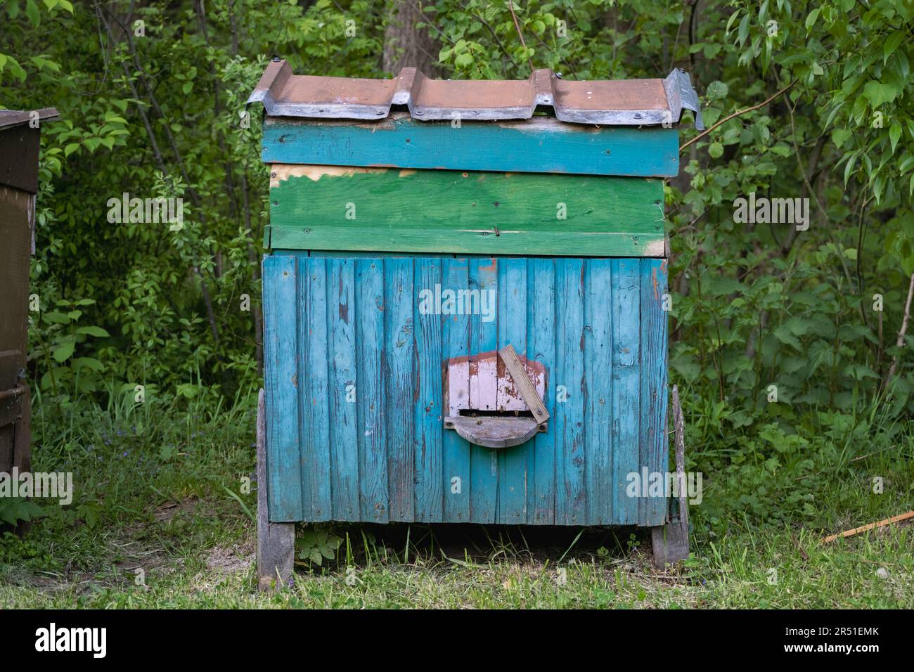Colorful homemade bee hives - old construction Stock Photo - Alamy