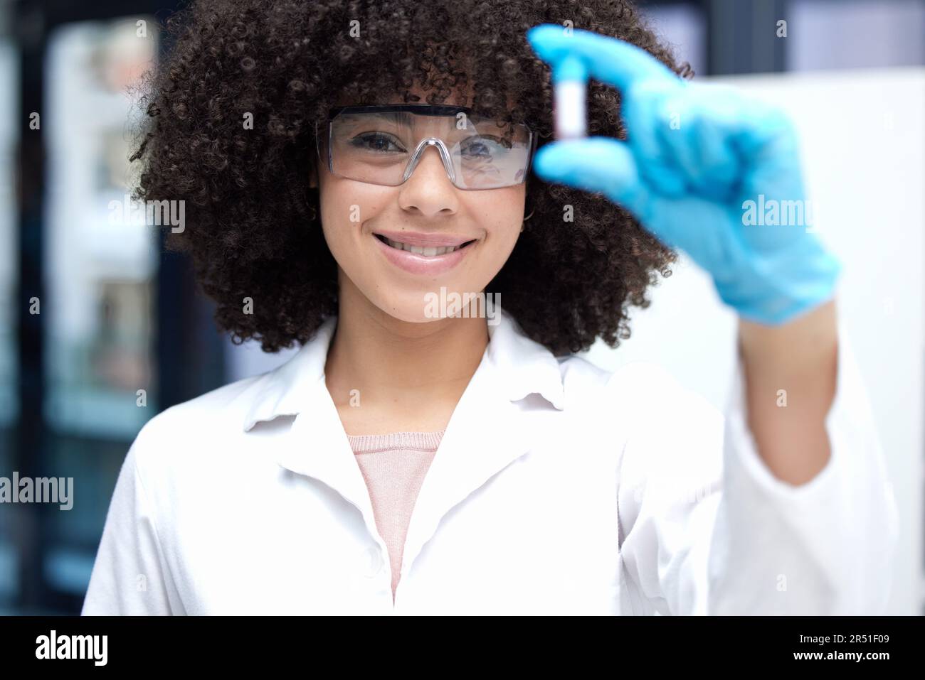 Science, vial and portrait of a female scientist working on research ...